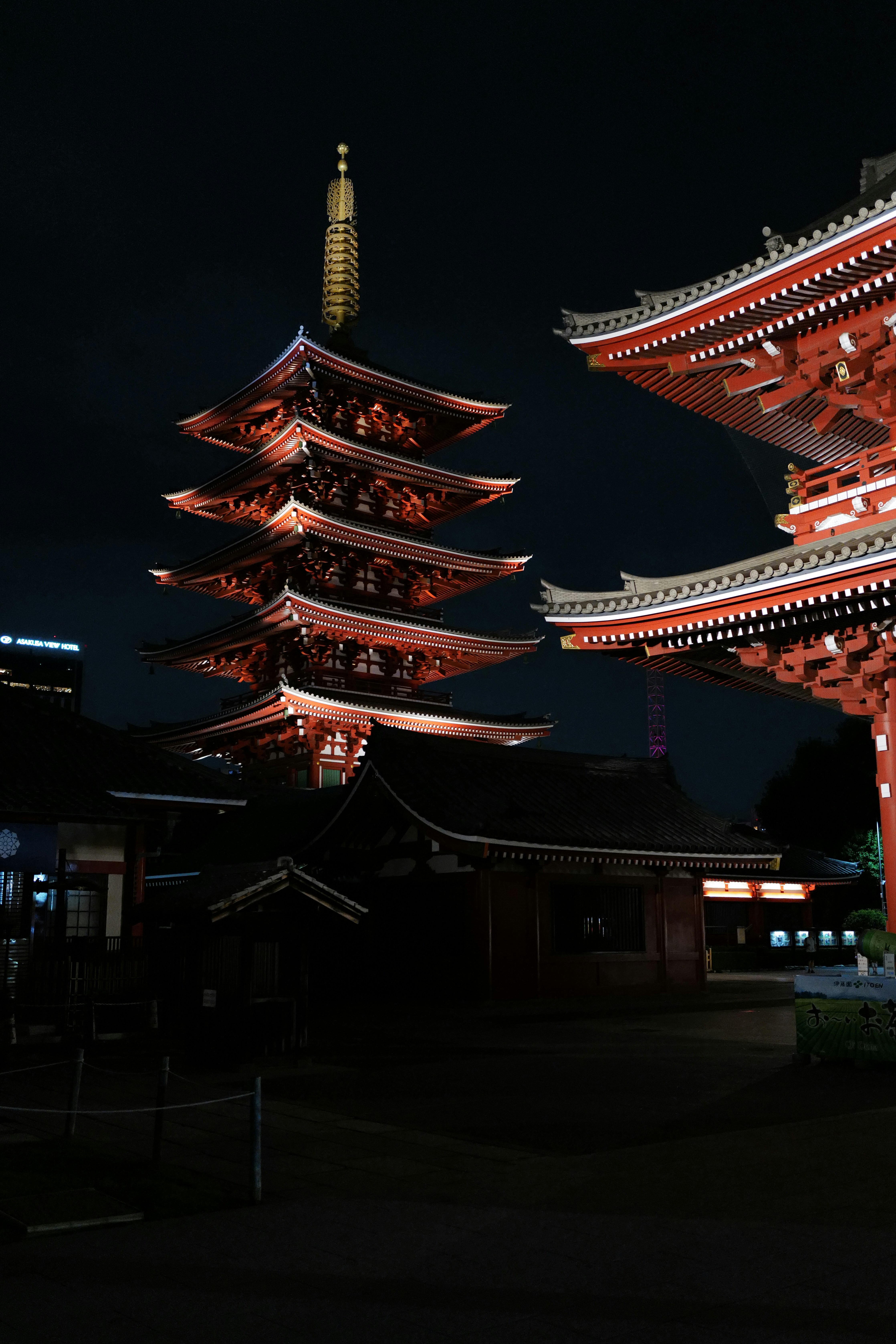 Nighttime Lanterns: A Five-Tier Pagoda and Gates in Soft Red Glow