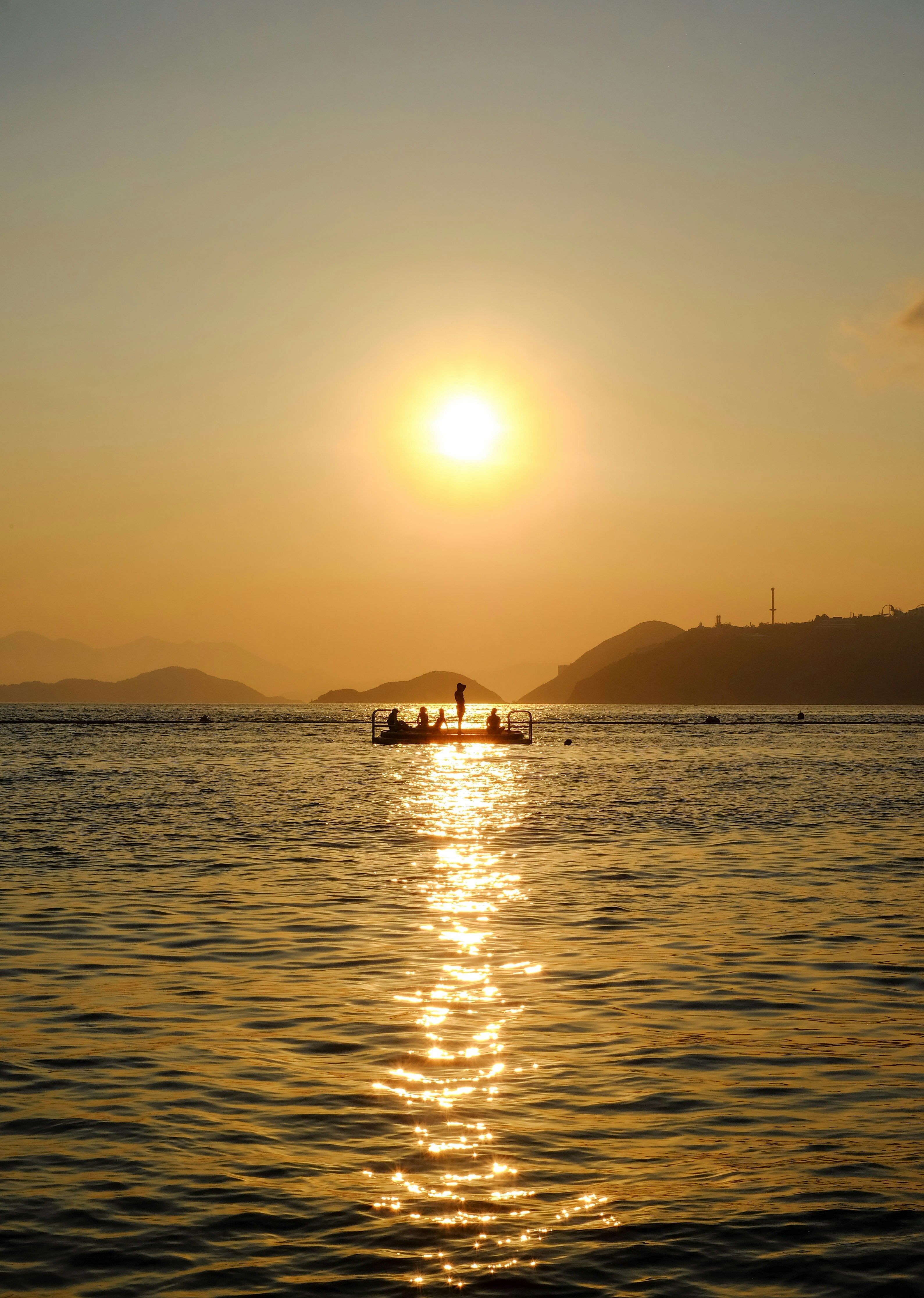 Sunlit Boat at Dusk: A Quiet Moment on the Quiet Sea