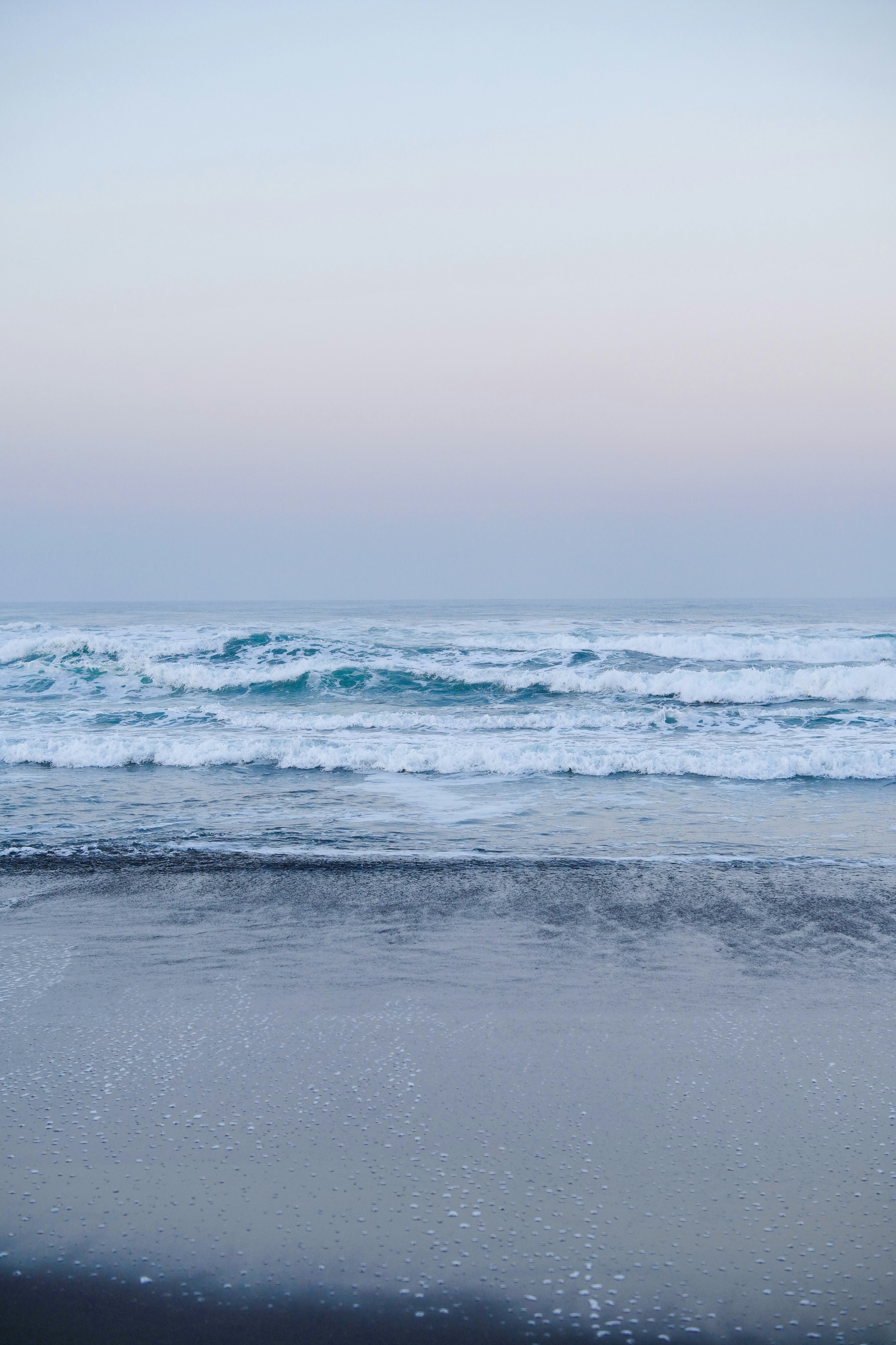 Quiet Horizon: A Gentle Tide Under a Pale Sky