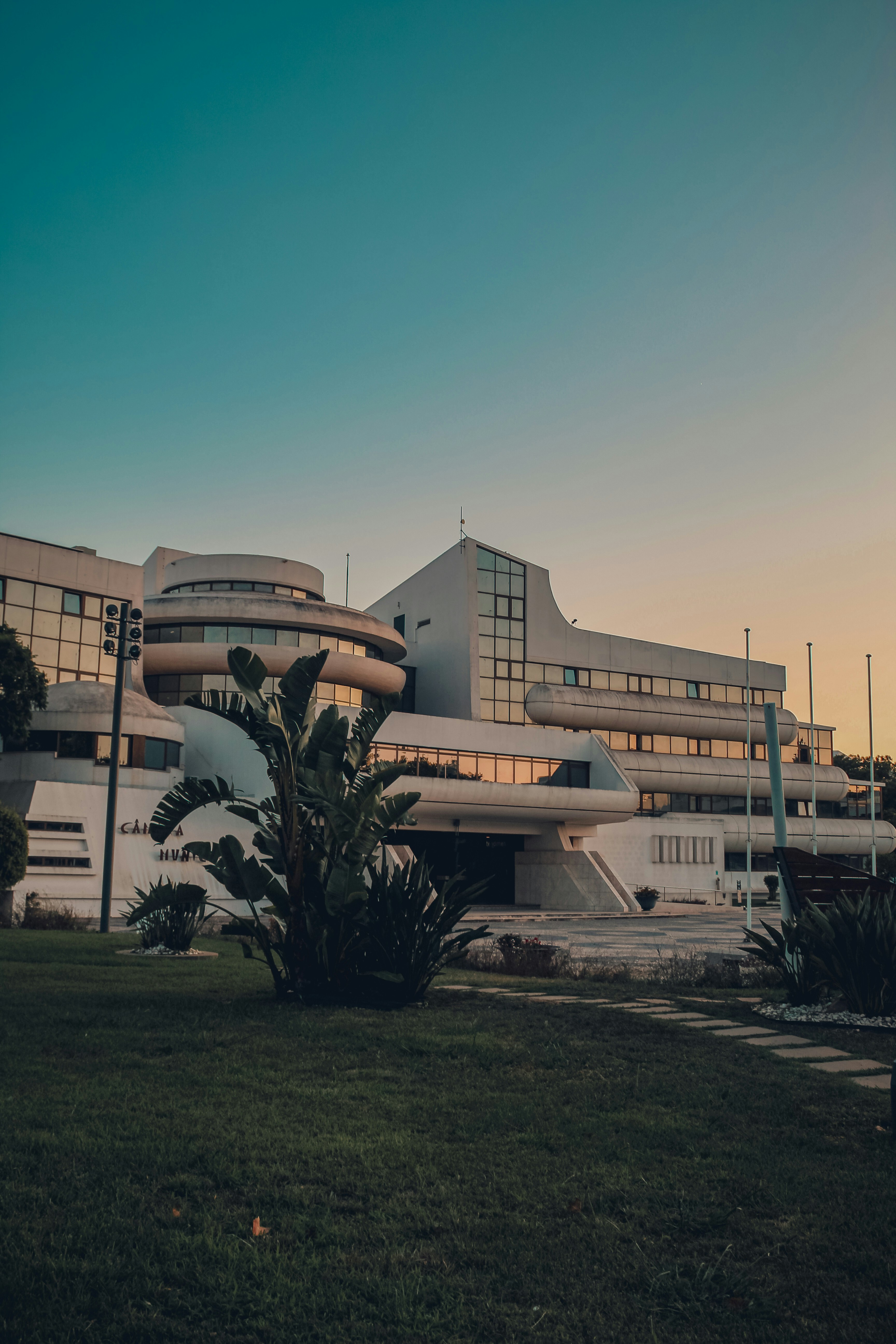 Modernist Campus at Dusk: Curves and Concrete in Quiet Light