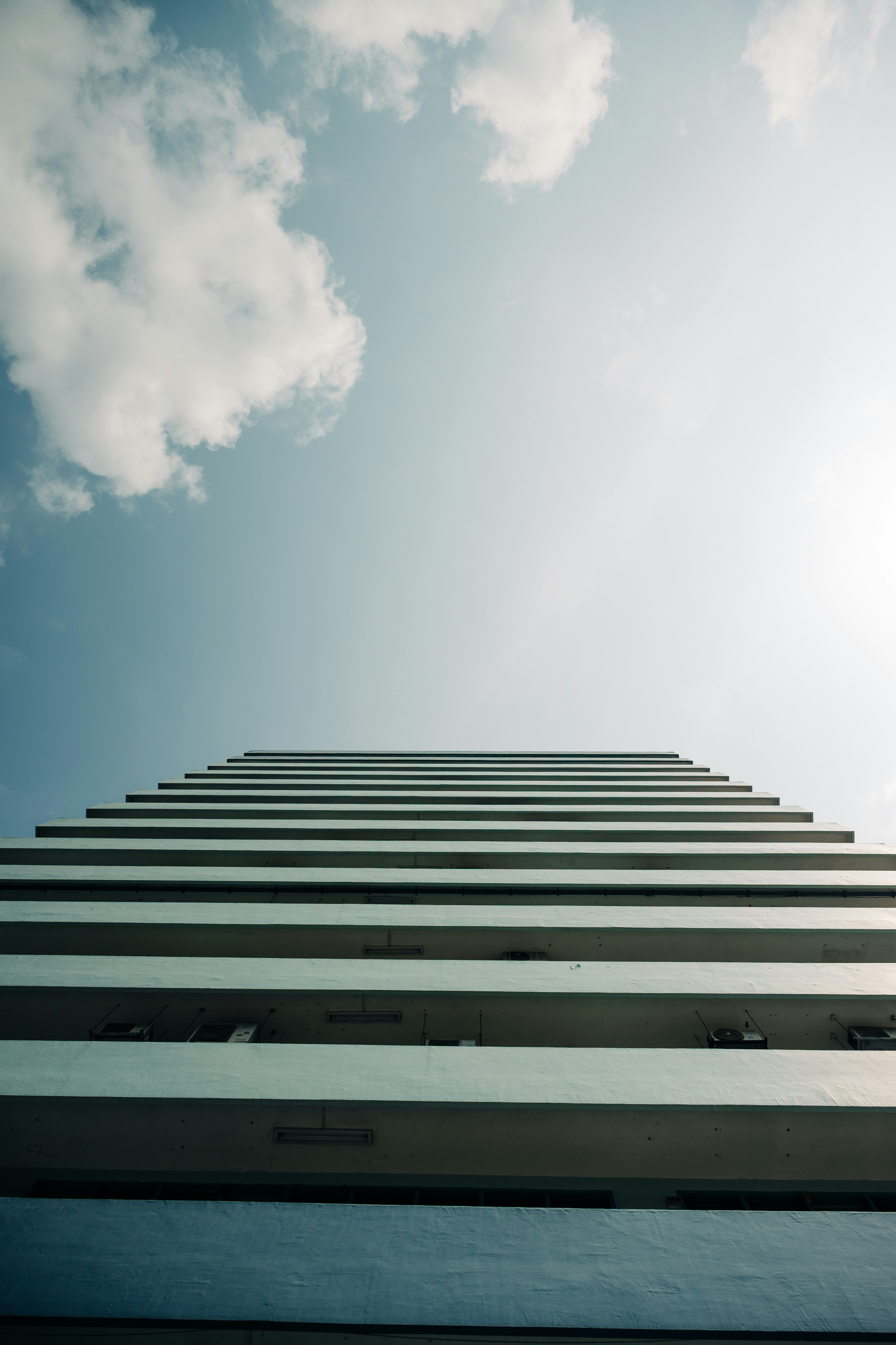 Ascending Lines: A Skyward View of a Towering Terrace