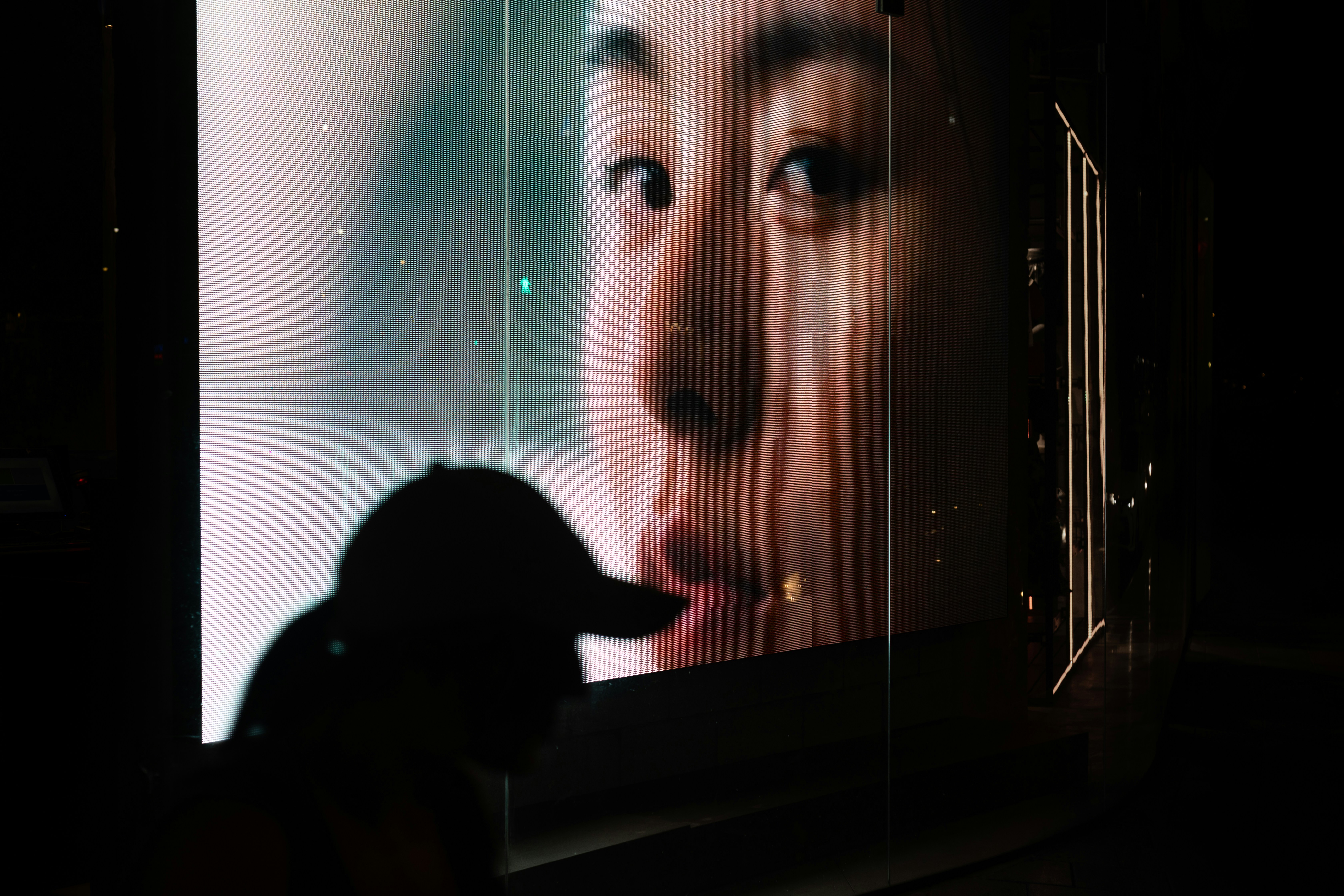 Gaze Past the Glass: A Portrait in a Screen’s Glow