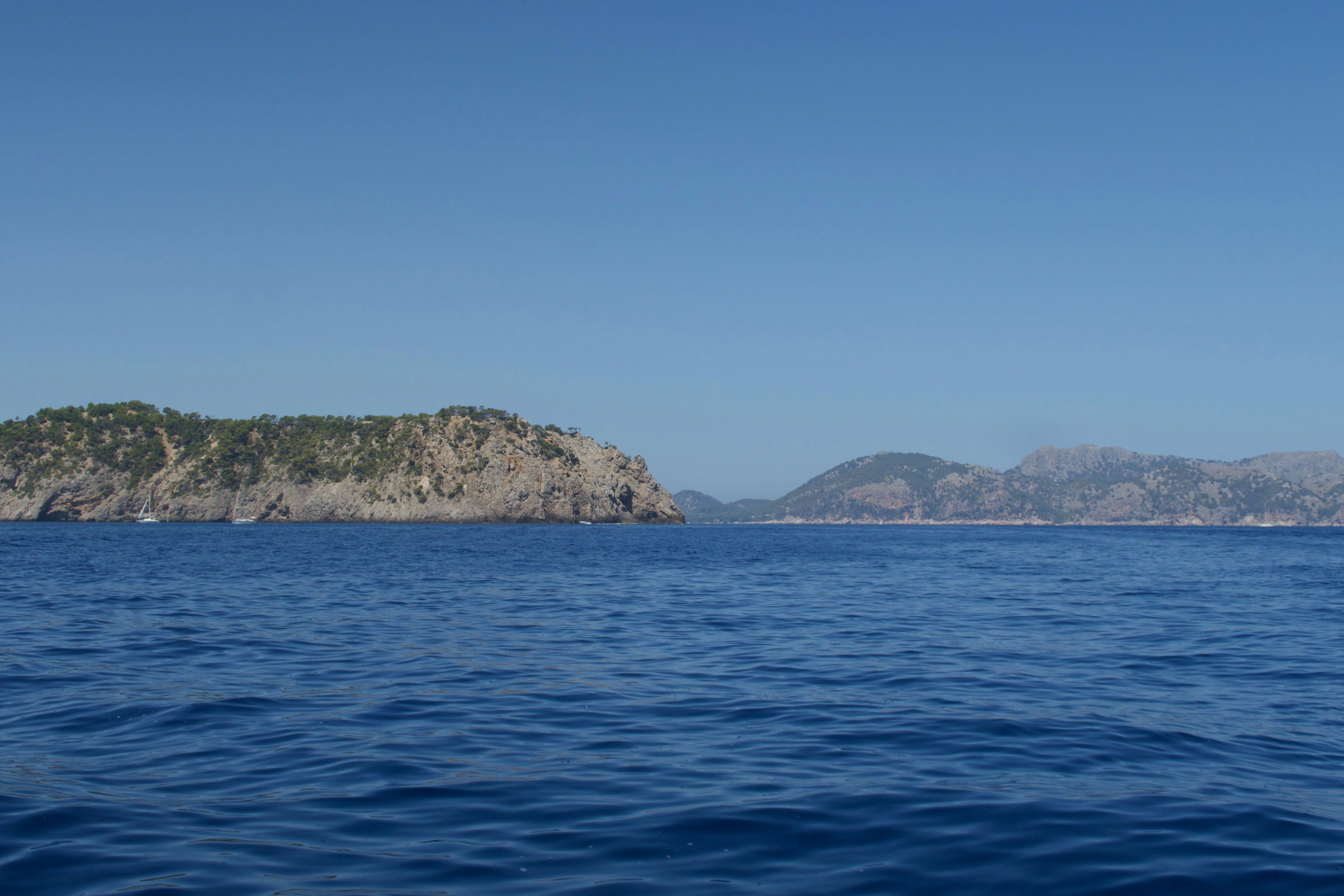 Calm blue horizon: islands meeting open sea