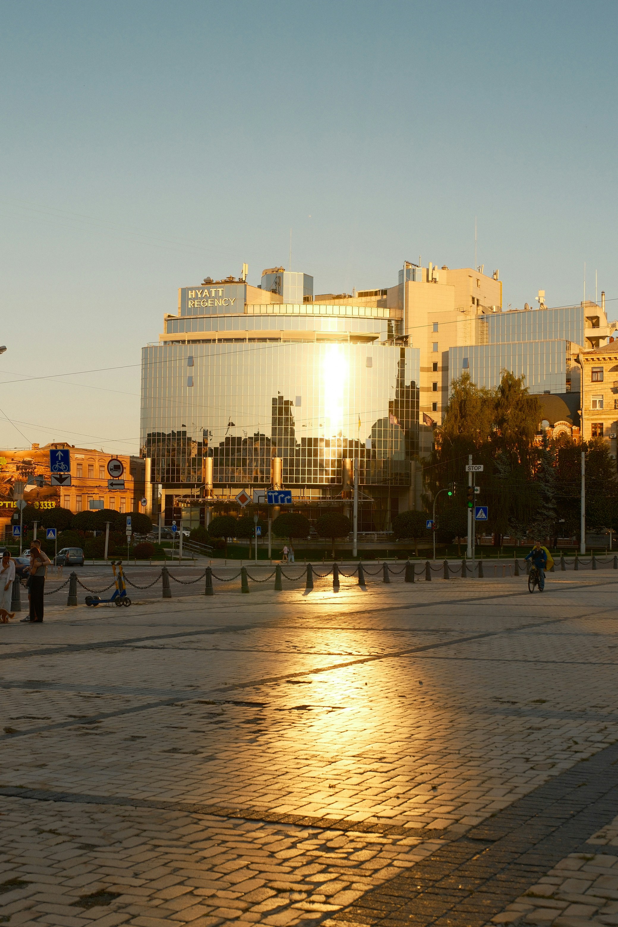 Sunlit Glass Facade Basks in Urban Quiet