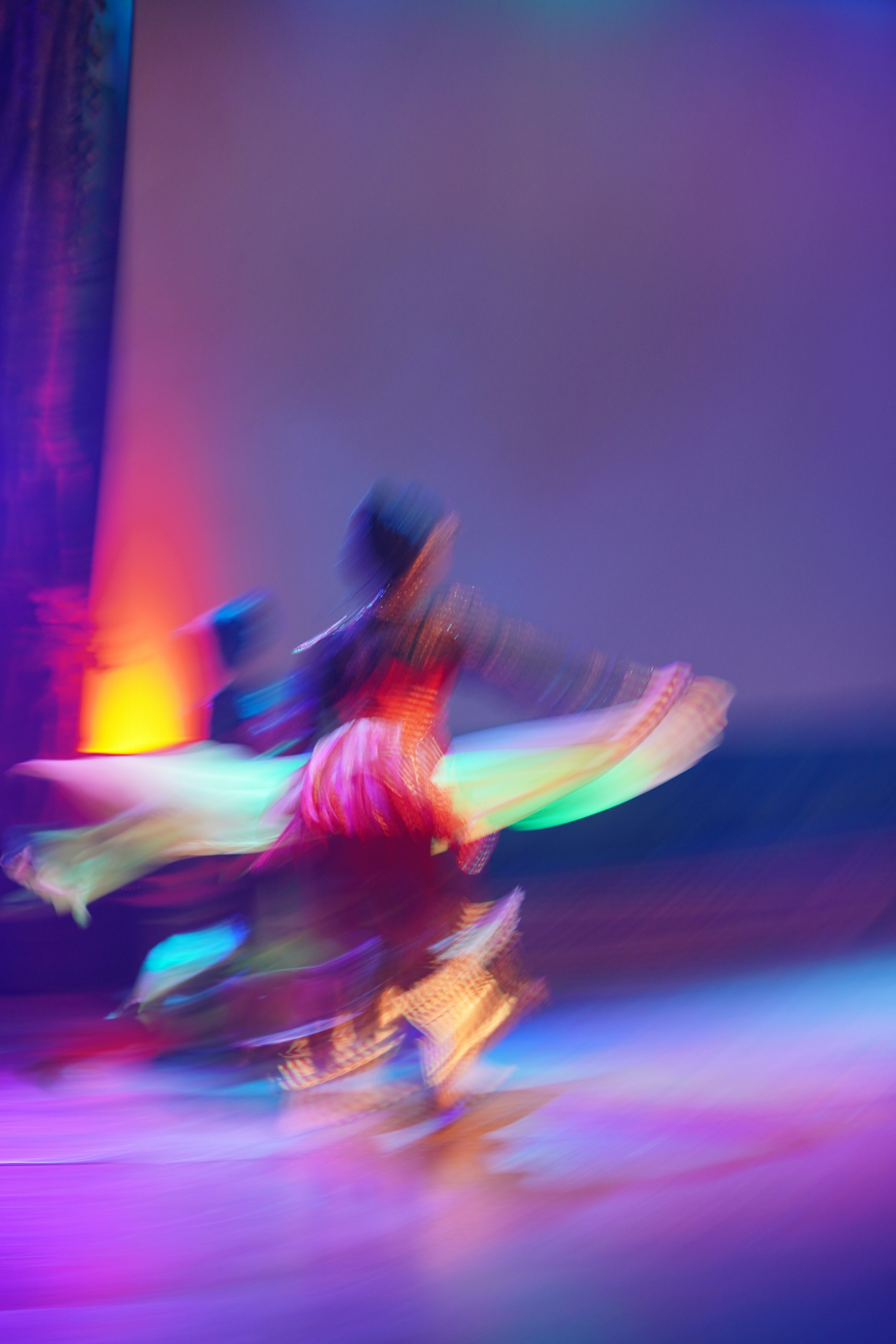 Dancer in Color: A Blurred Motion of Light and Silk