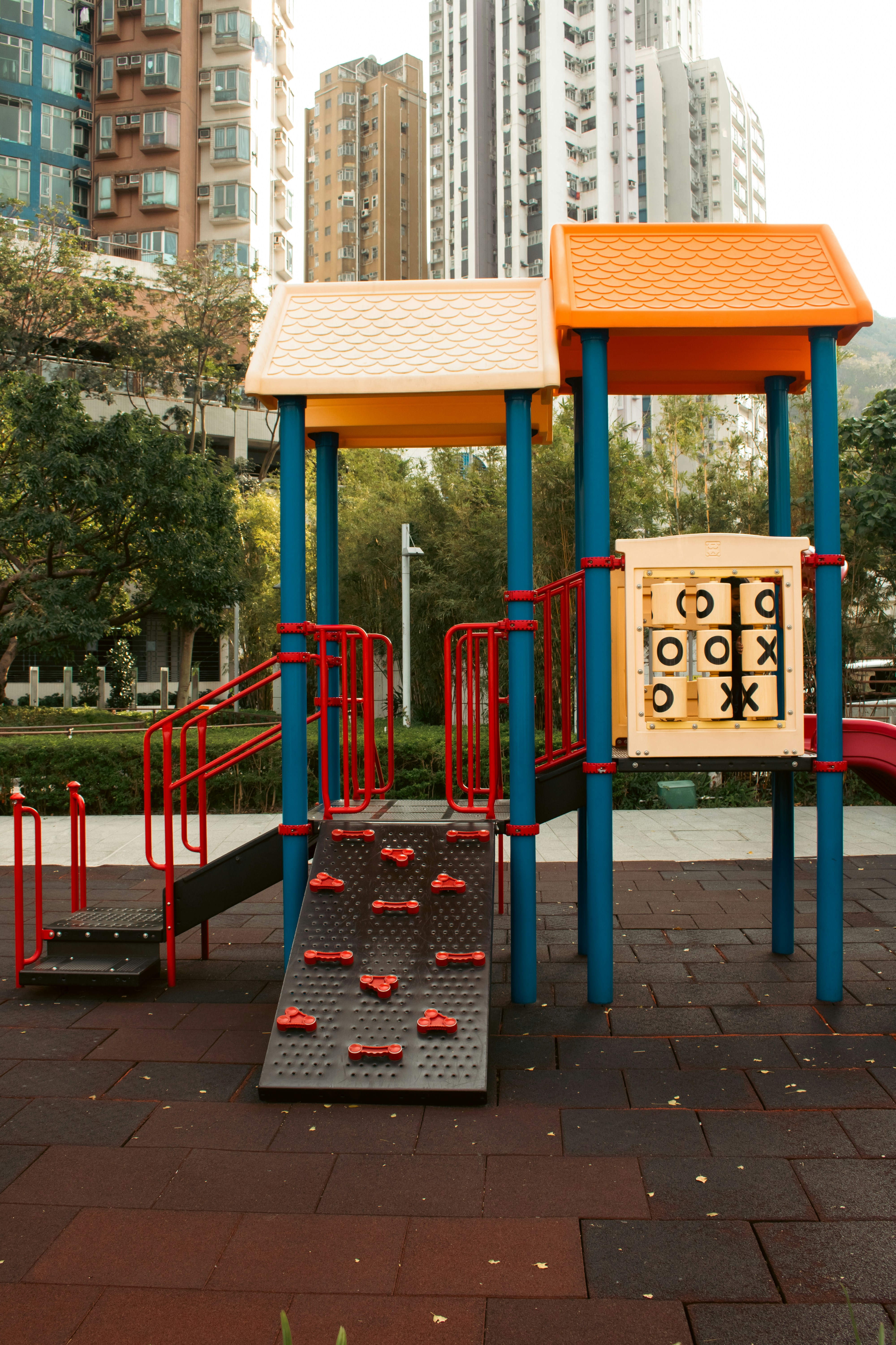 Colorful Playground Odyssey Amid Urban Towers