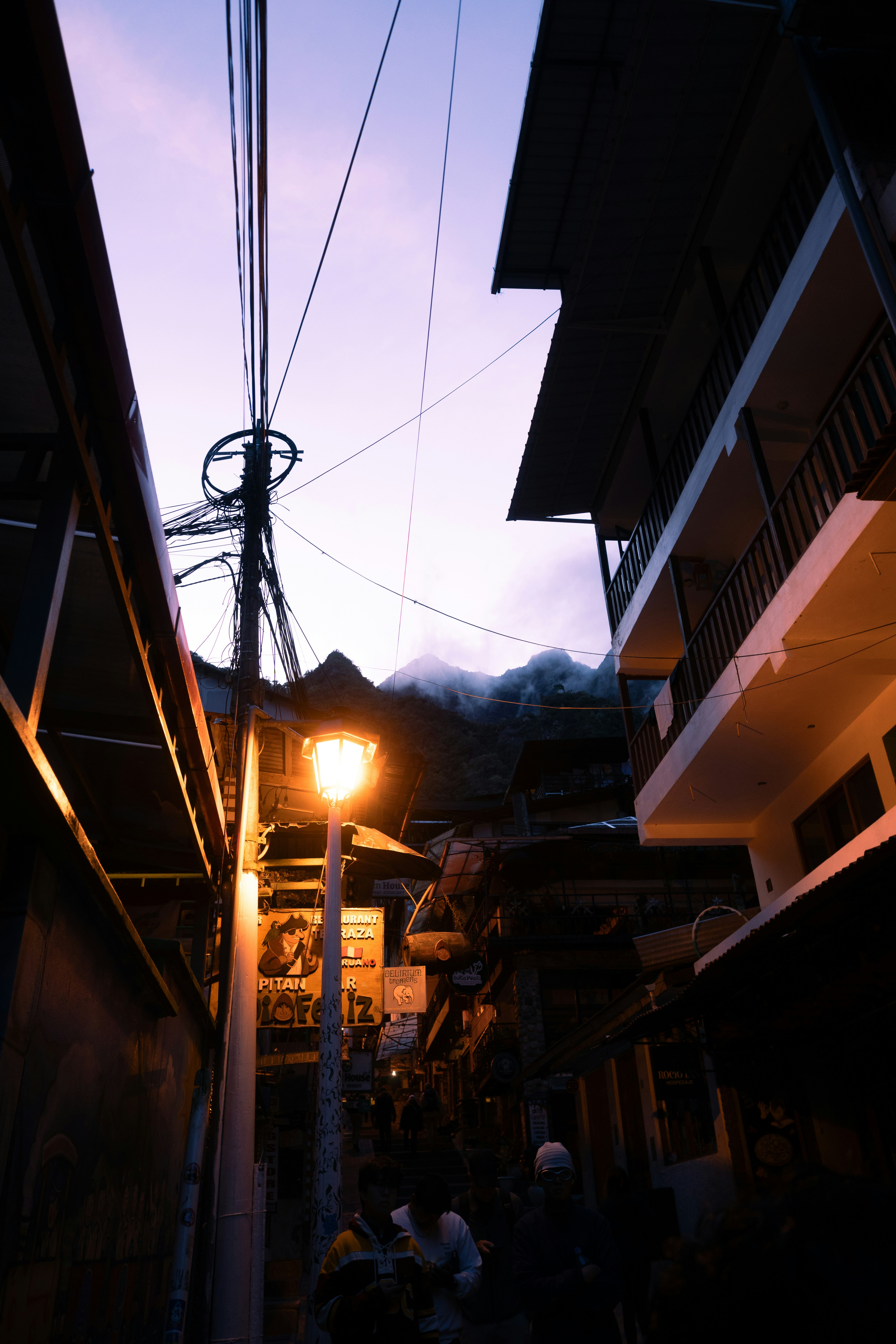 Twilight Lanterns Over a Mountain Town Alley