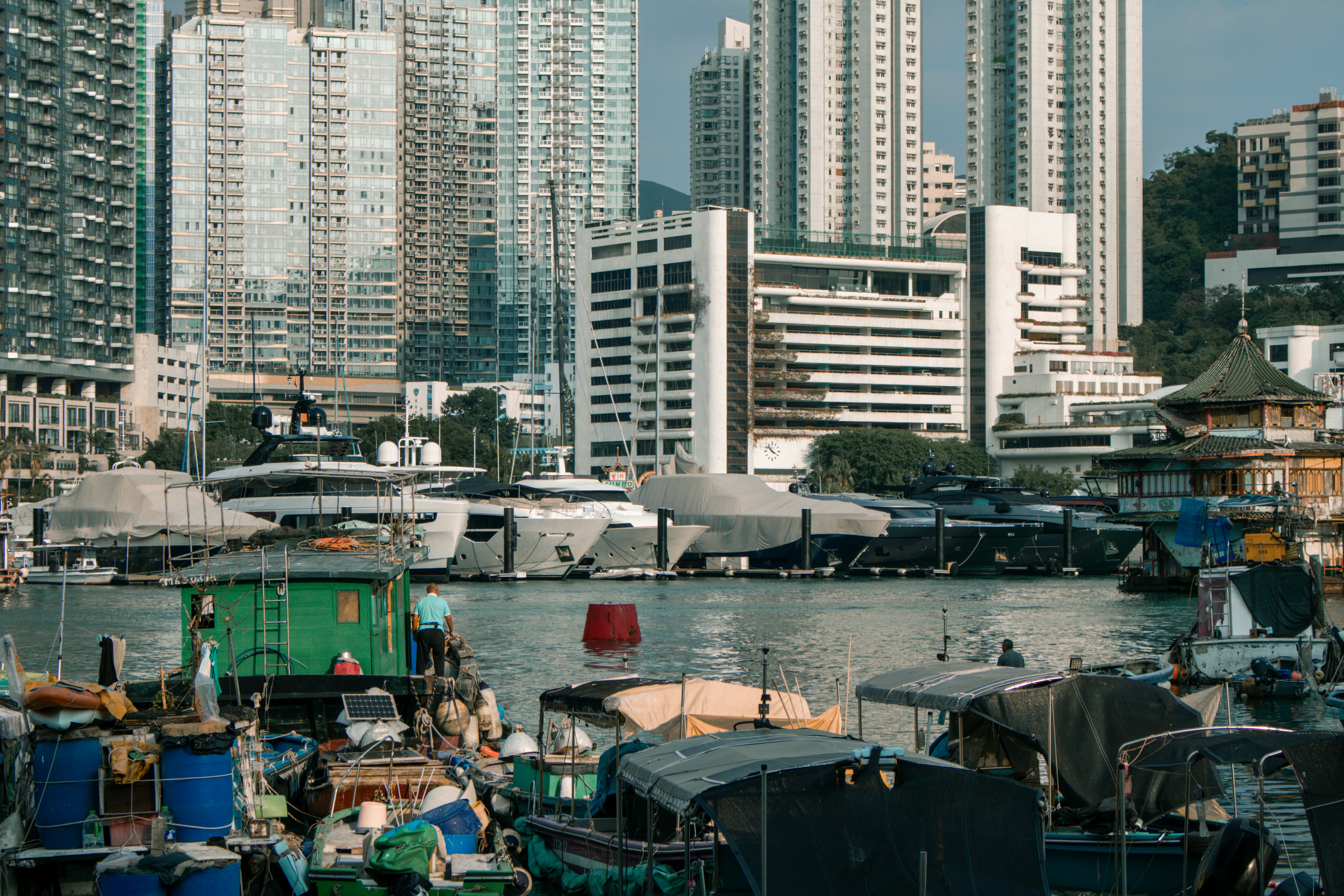Marina Cliffhanger: Urban Docks Meet Glass Towers