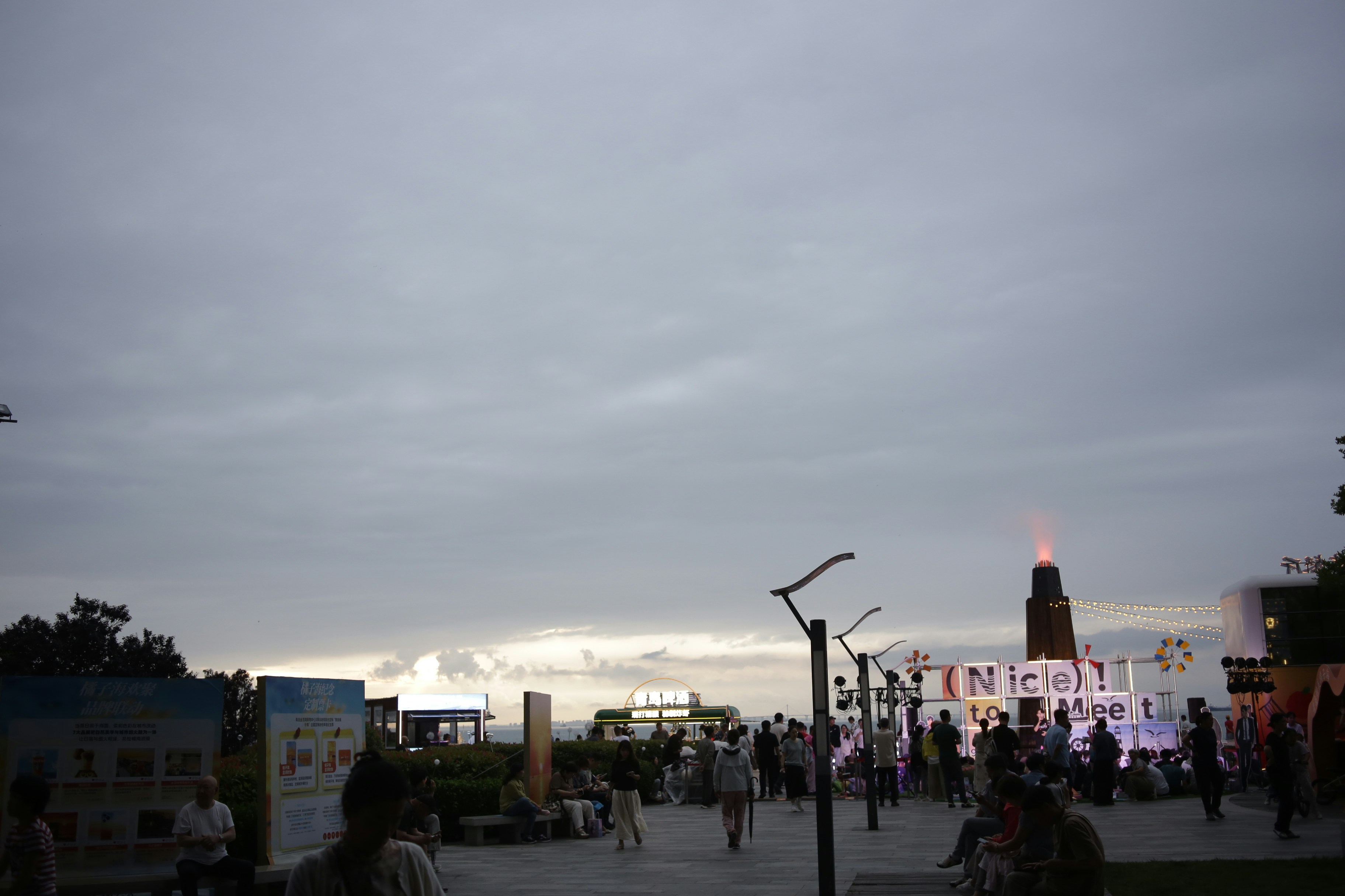 Evening Glow Over a Festive Pier
