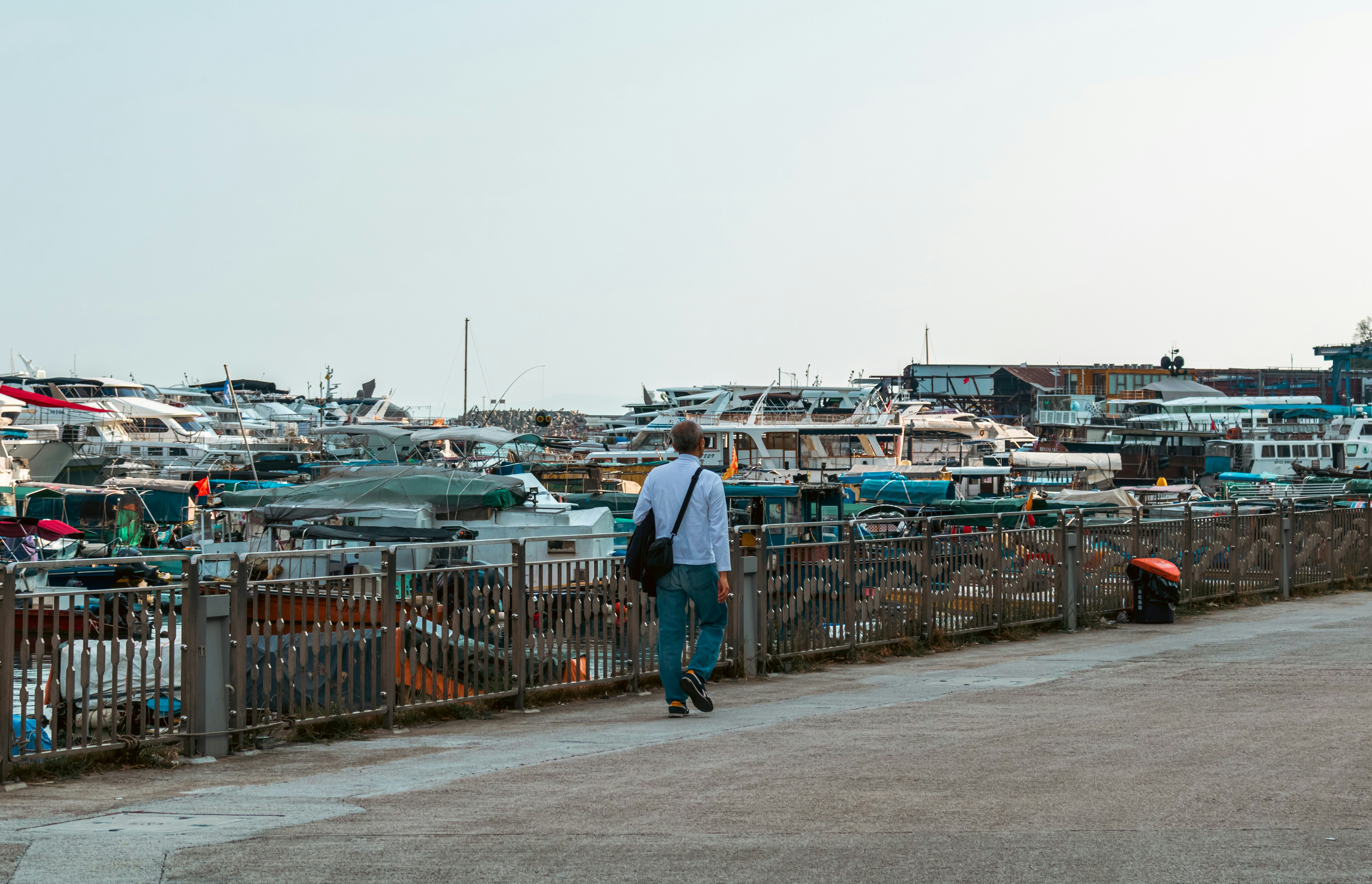Strolling Toward the Marina: A Quiet Moment Amid the Docks