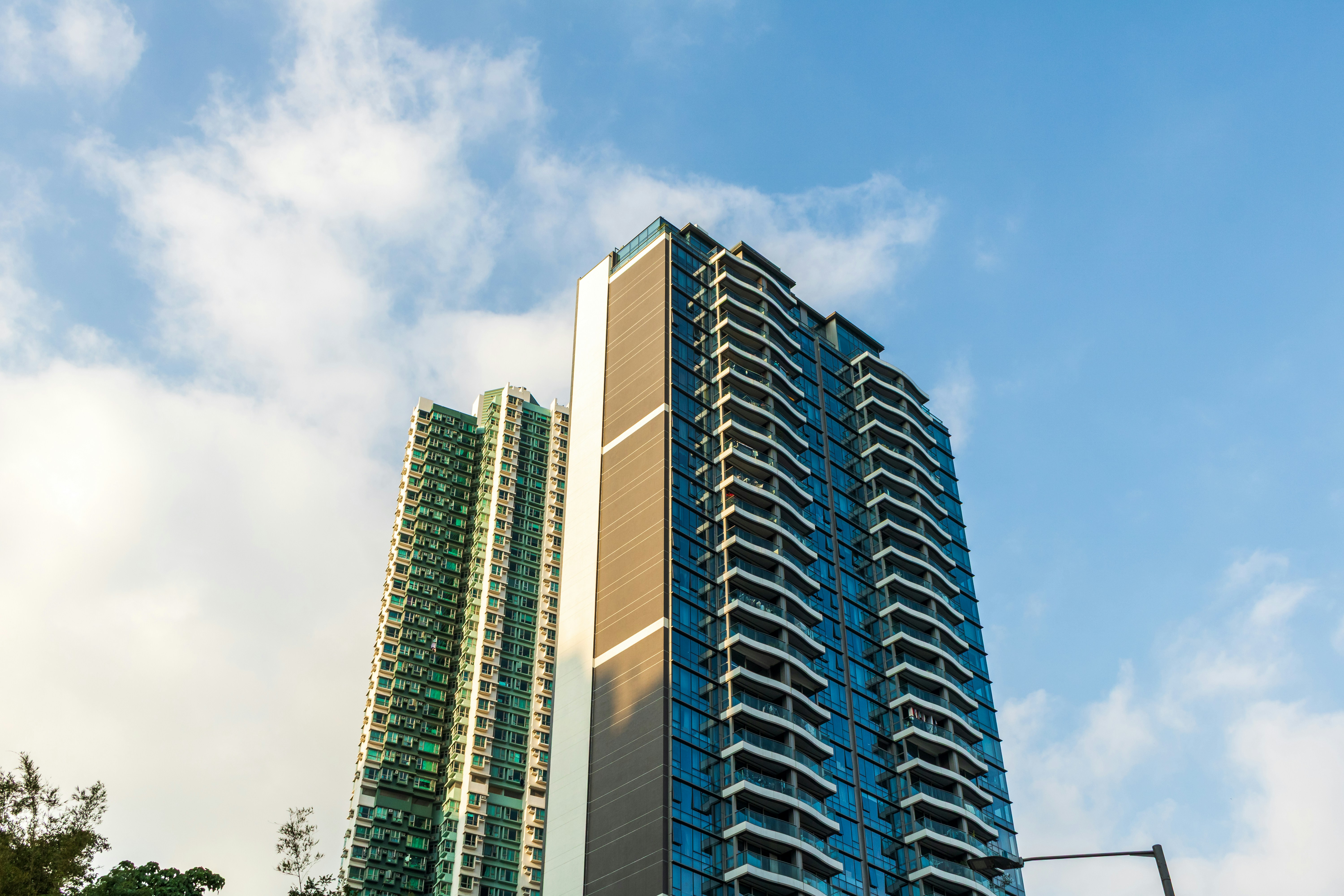 Skyward Modernity: Twin Towers Against a Clear Noon