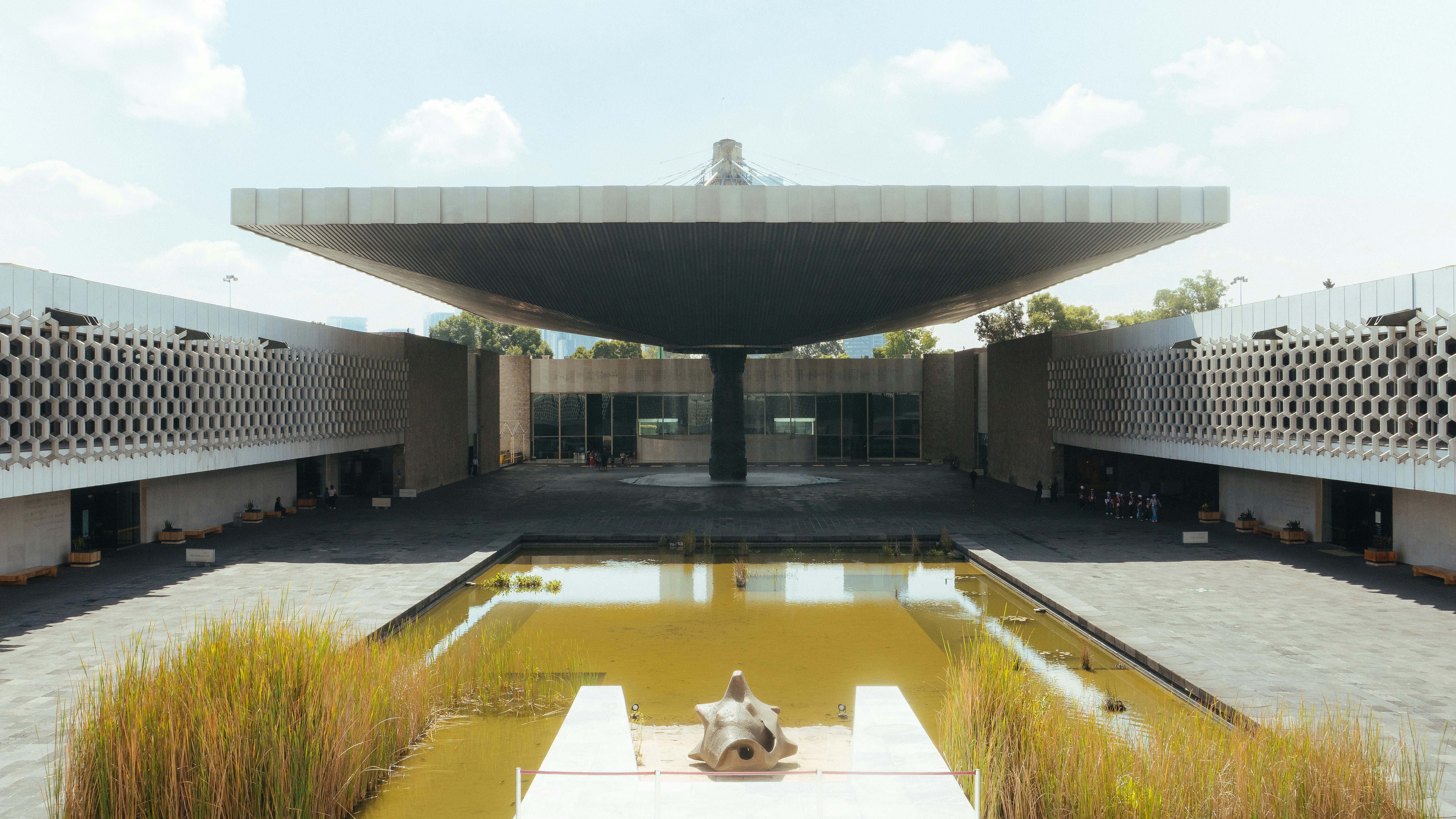 Symmetrical Pavilion Over a Reflective Pool