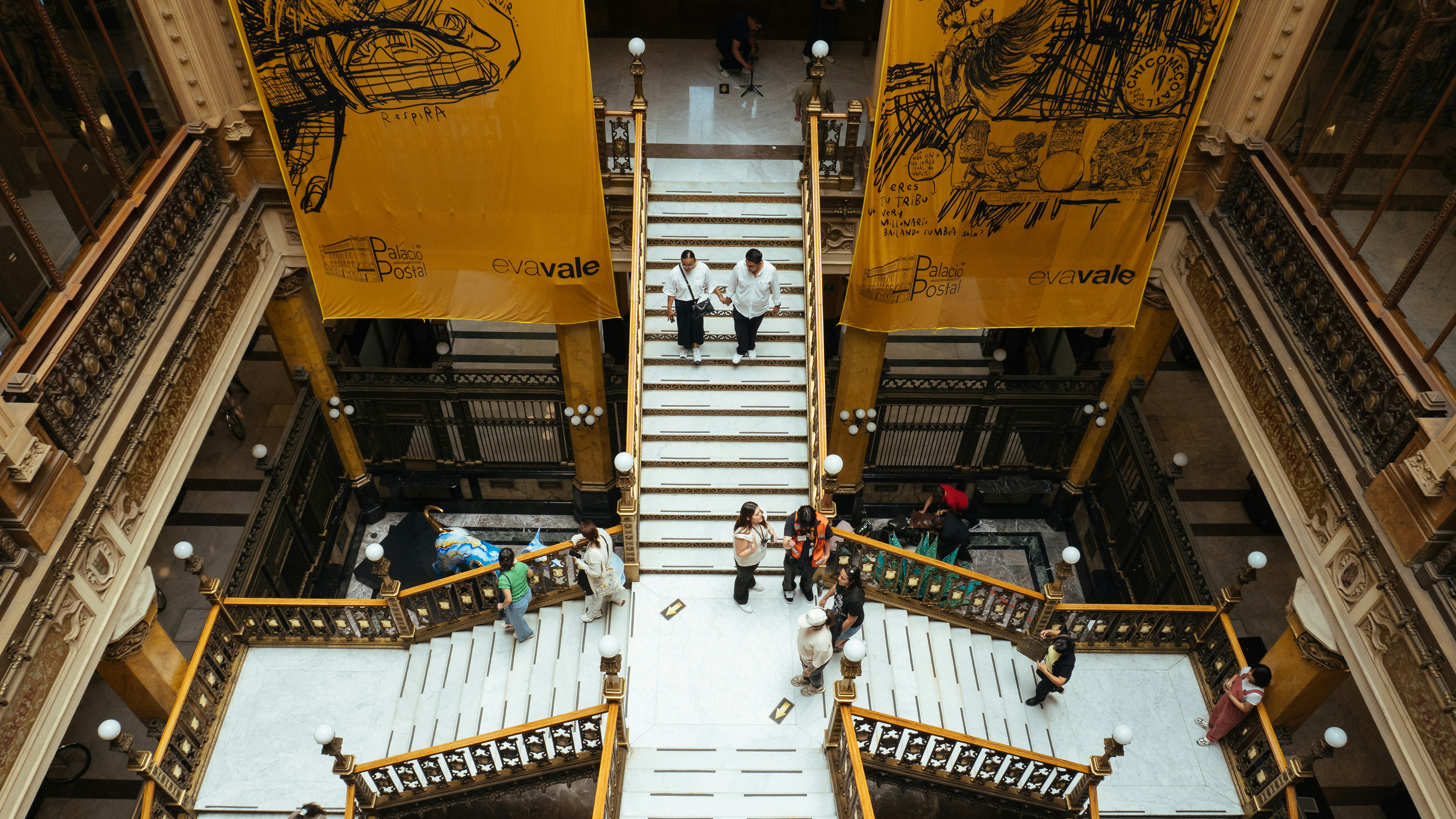 Grand Atrium Corridor: People Crossing the Central Staircase