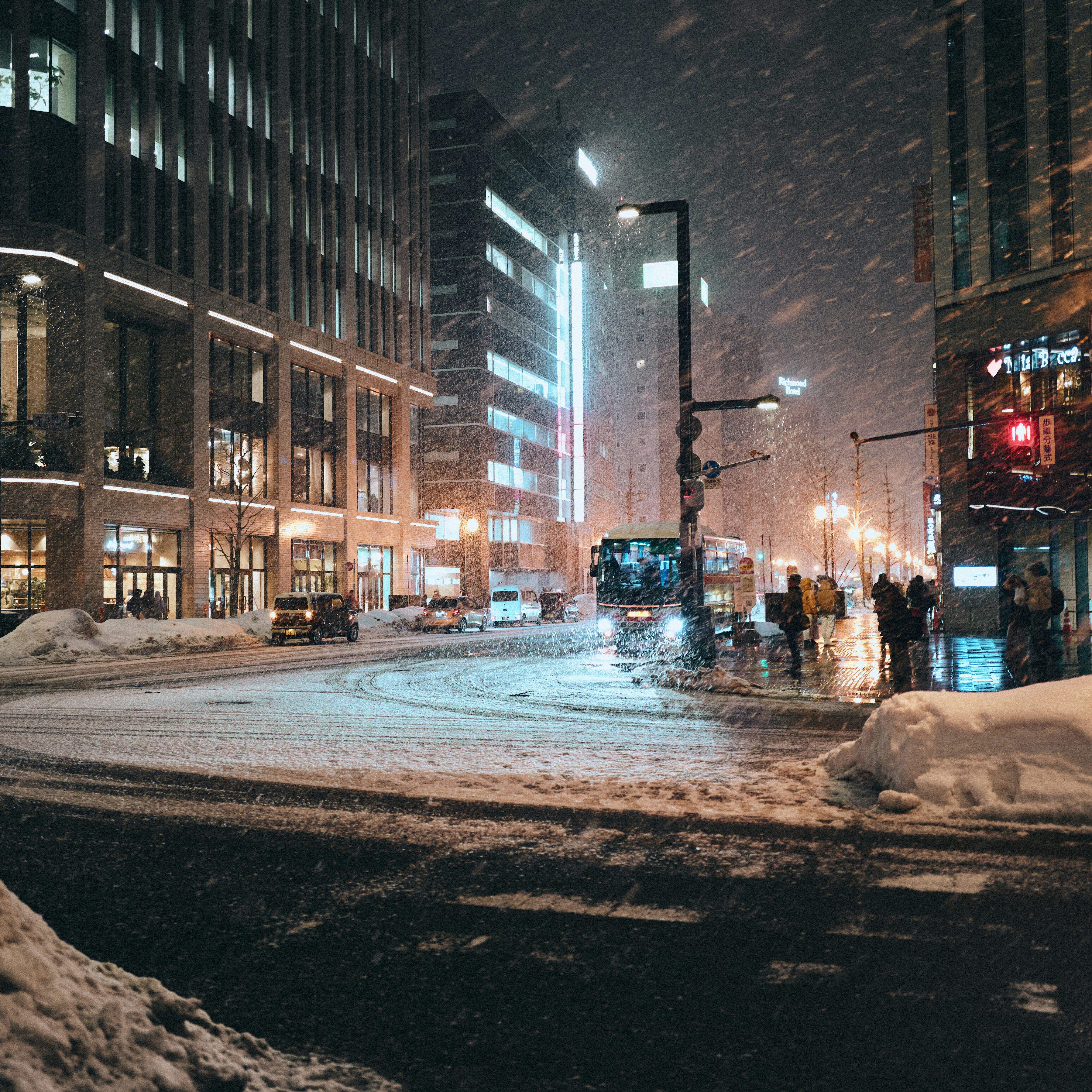 Neon Snowfall over a City Verge