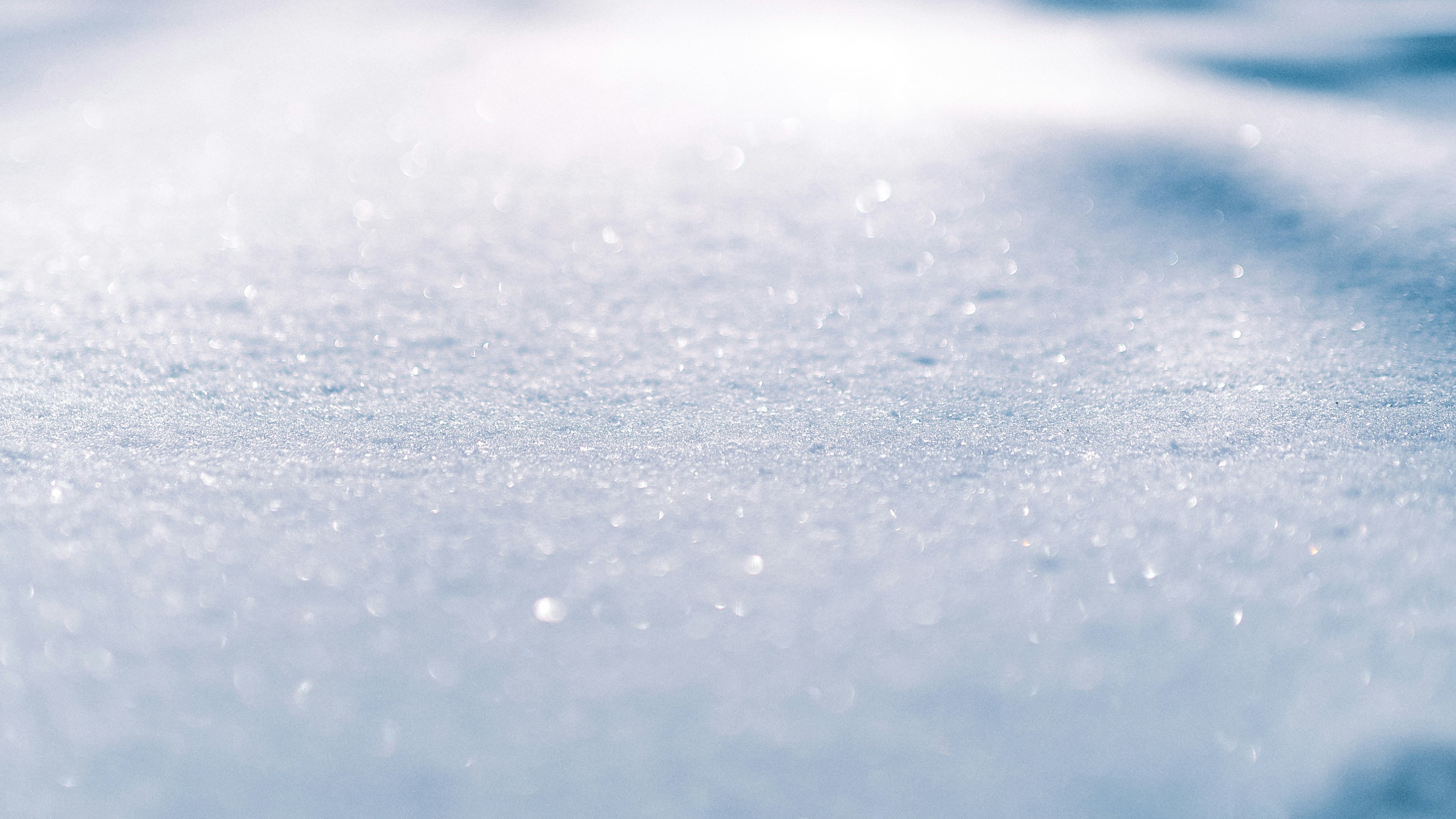Glacial Sparkle: Sunlit Snow Texture Across the Quiet Field