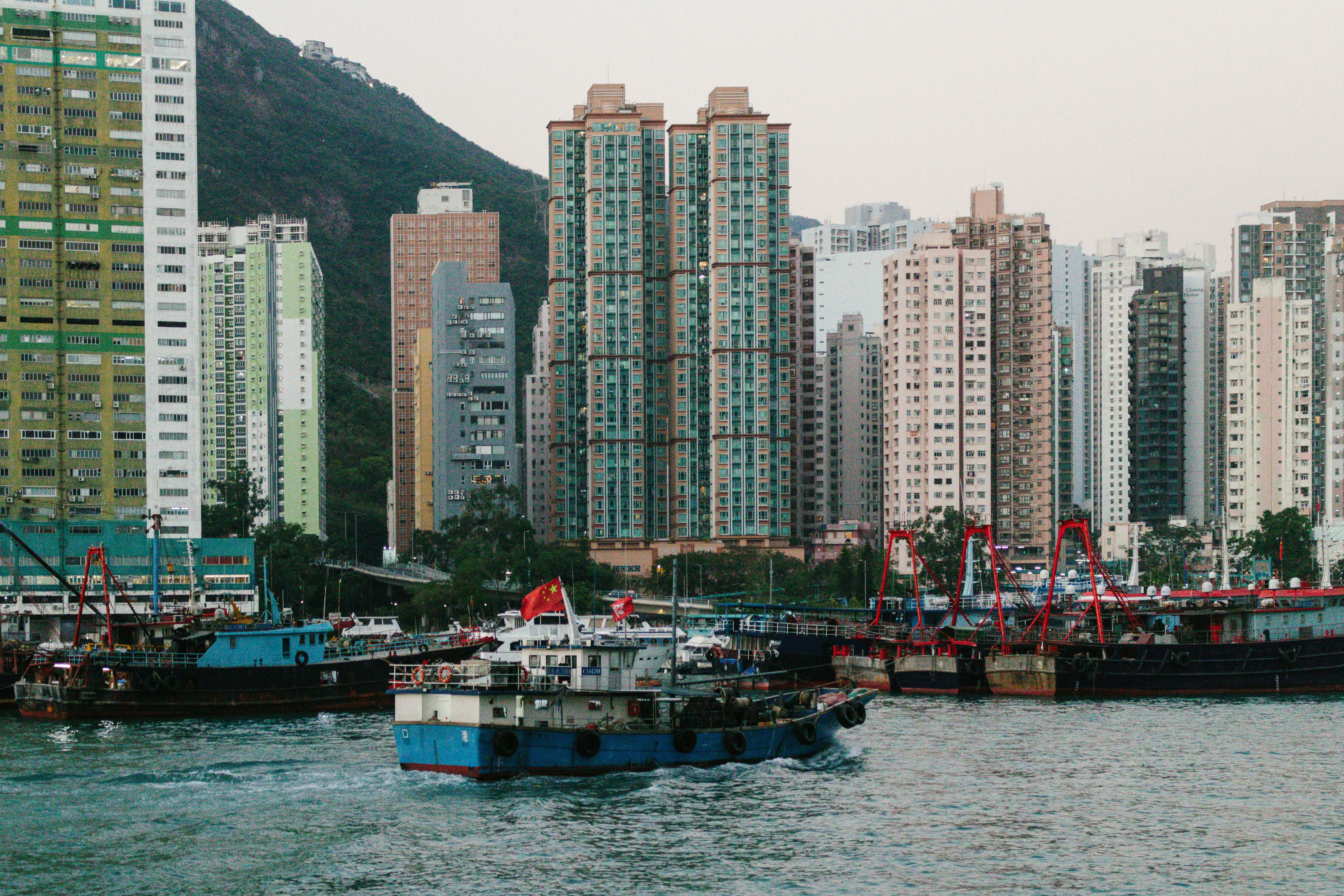Harbor Docks at Dusk: A Wall of Towers Over the Fleet