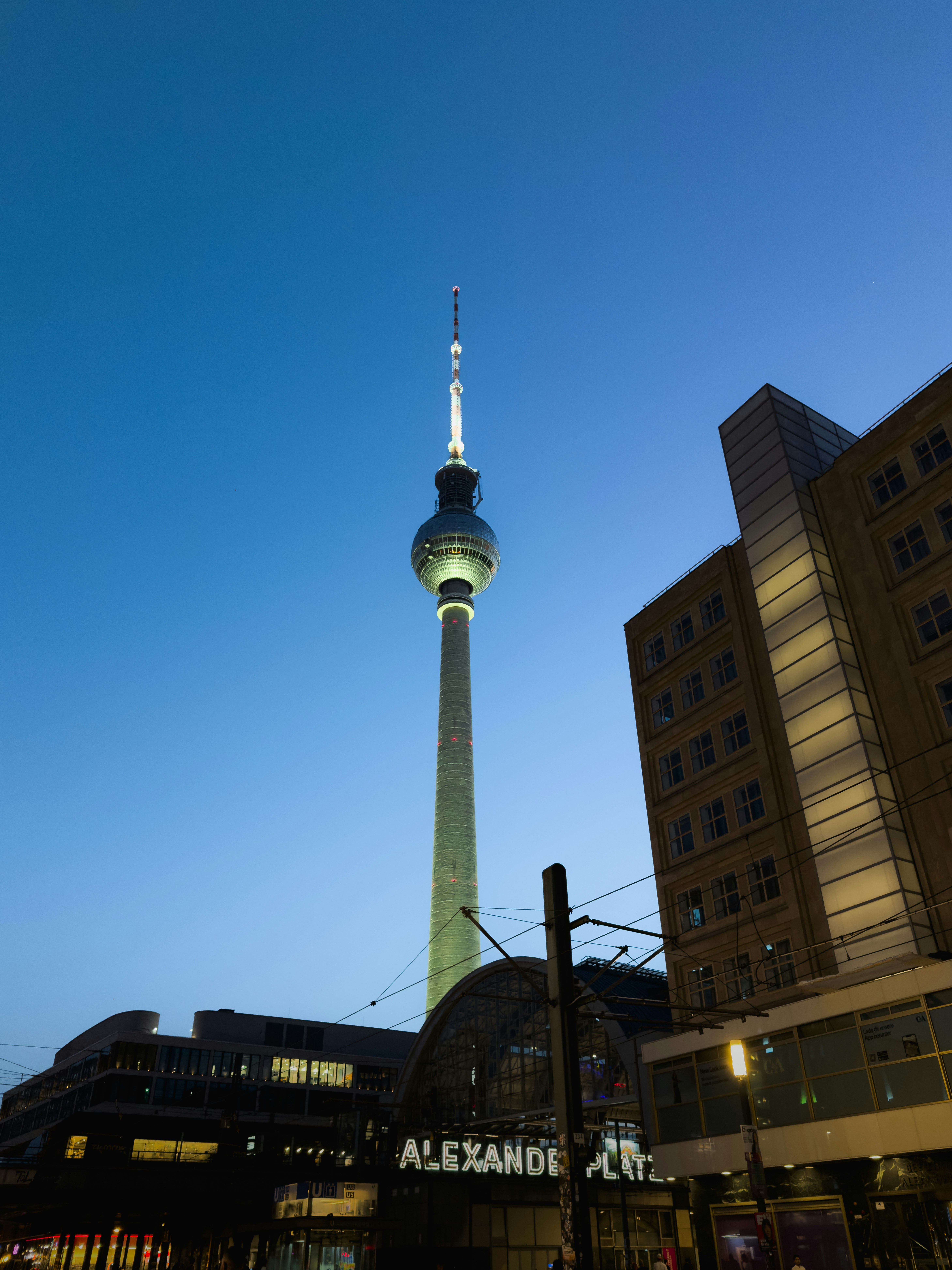 Berlin-like tower rises over urban glass and brick