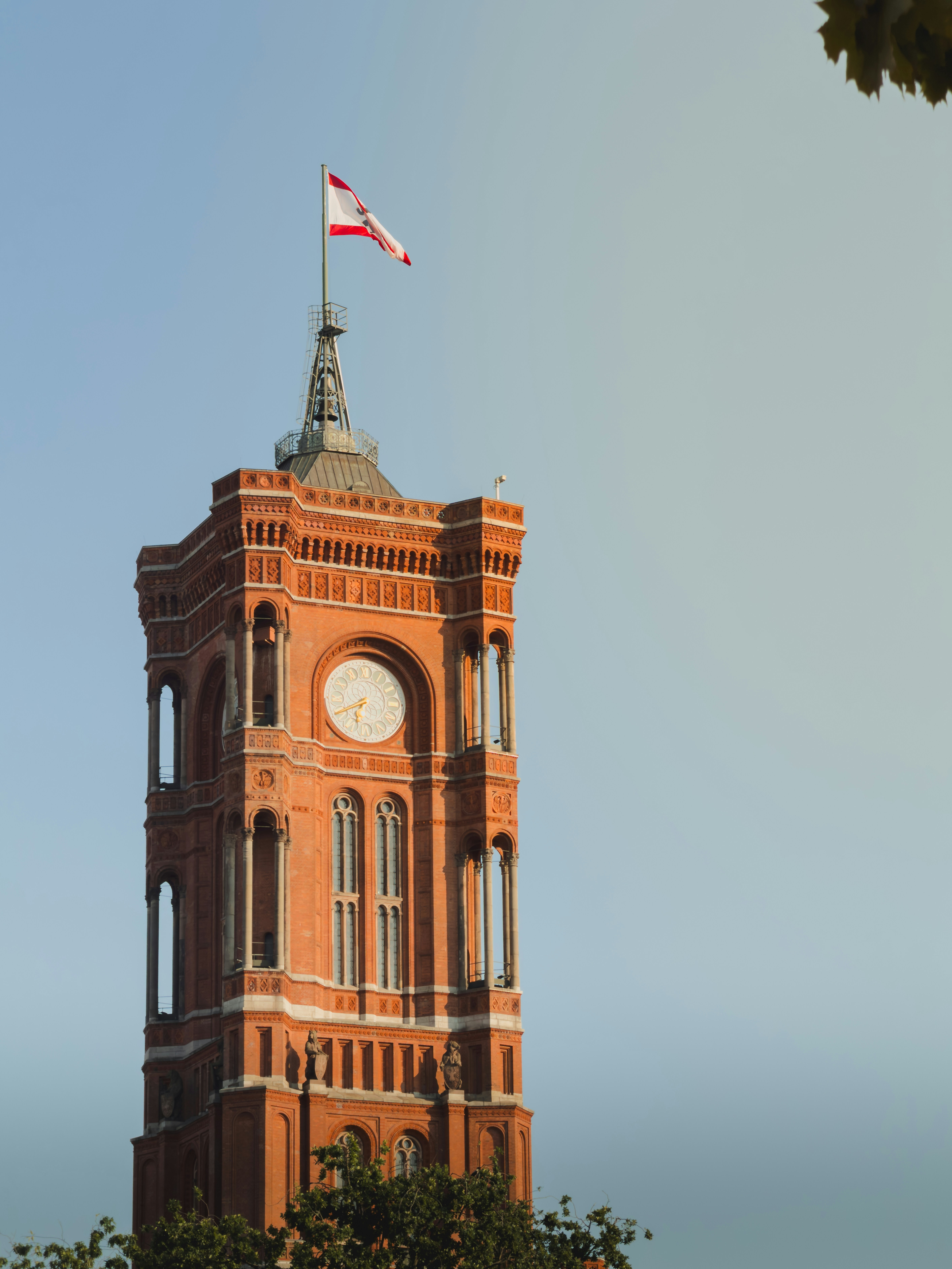Brick Clock Tower Reaching Toward a Clear Sky