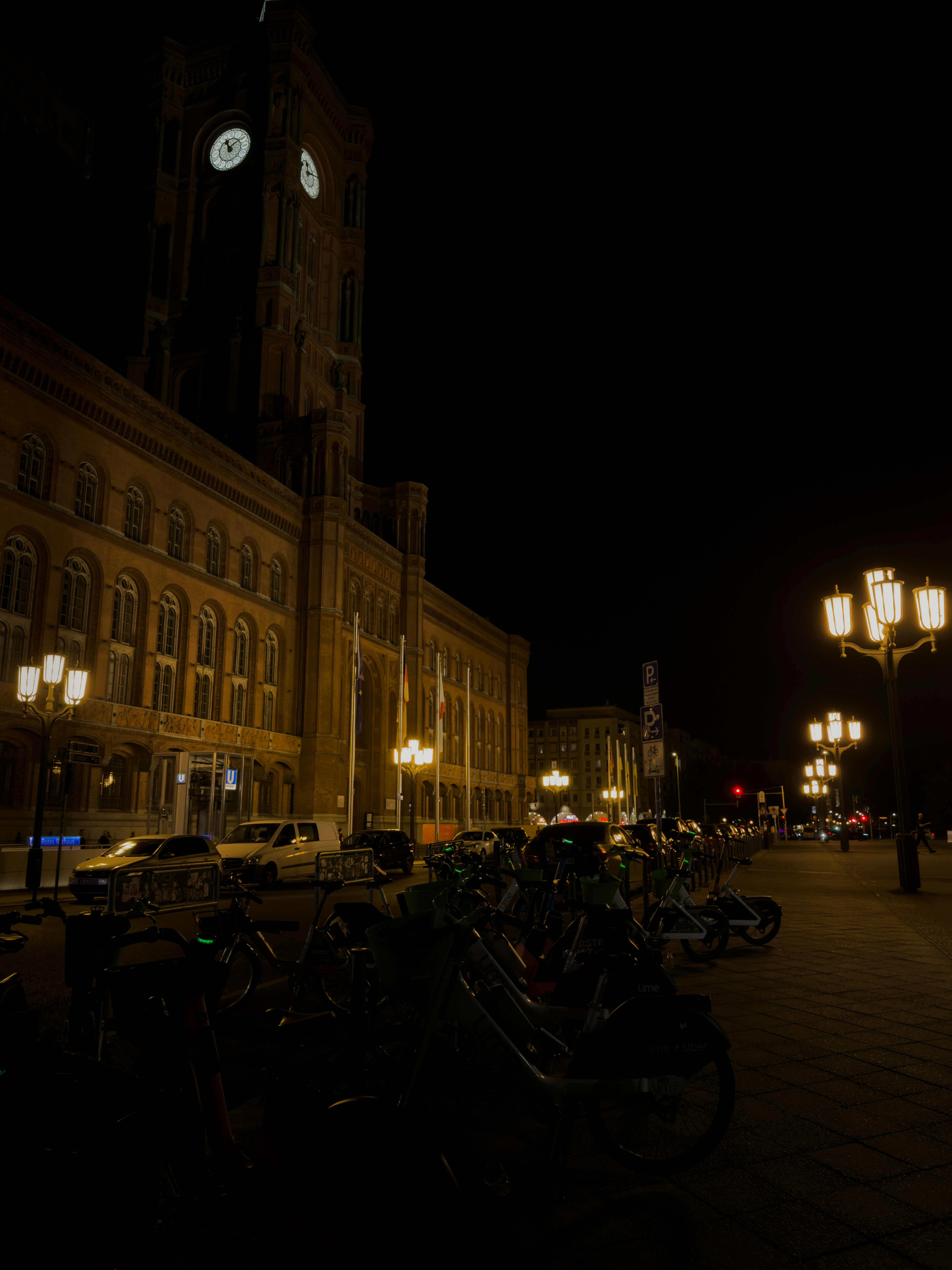 Night at the Clocktower Front: Lanterns and Bicycles in a Historic Campus Square