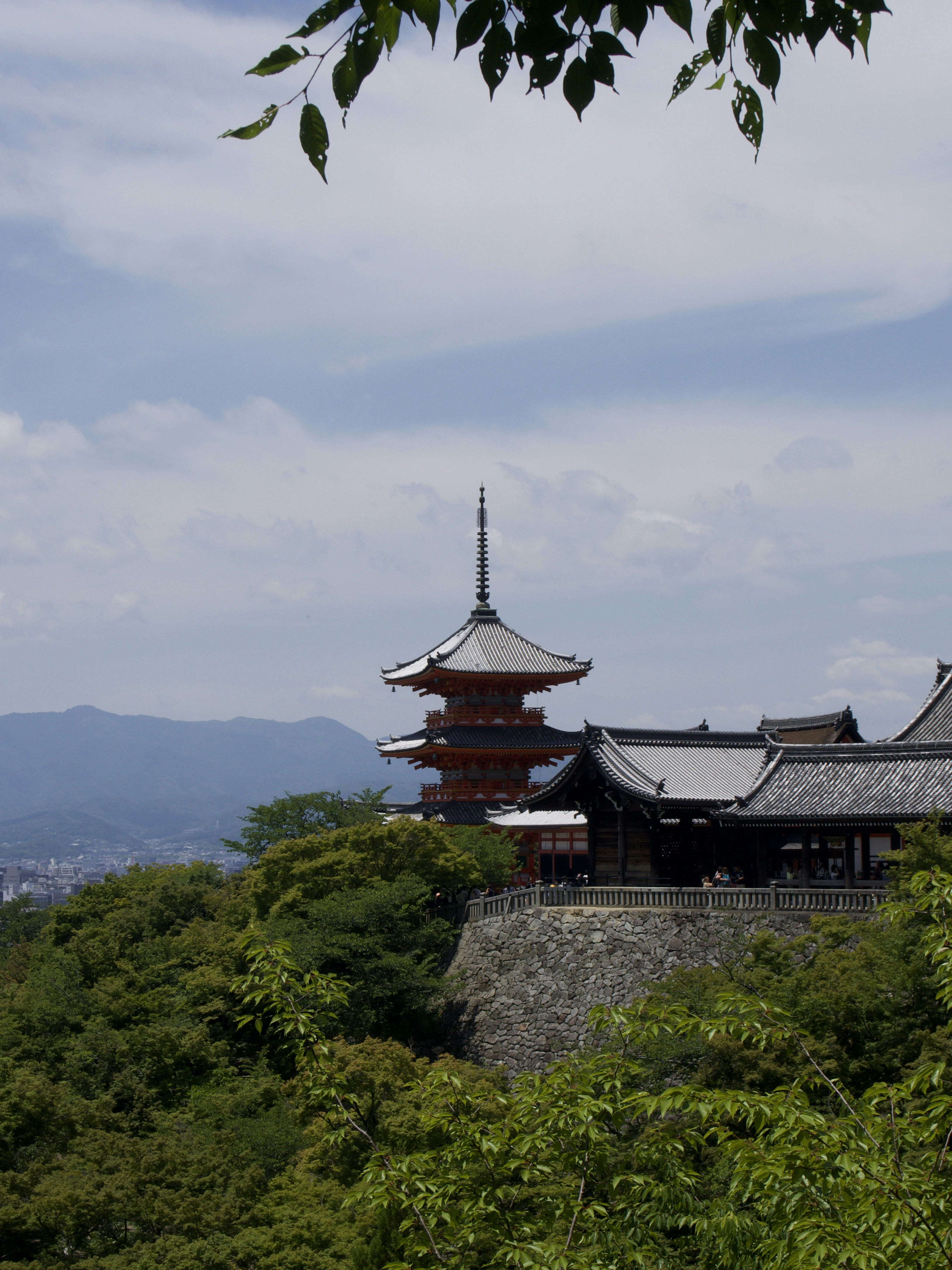 Pagoda Overlook: A Tranquil Temple Clifftop Amid Lush Greenery