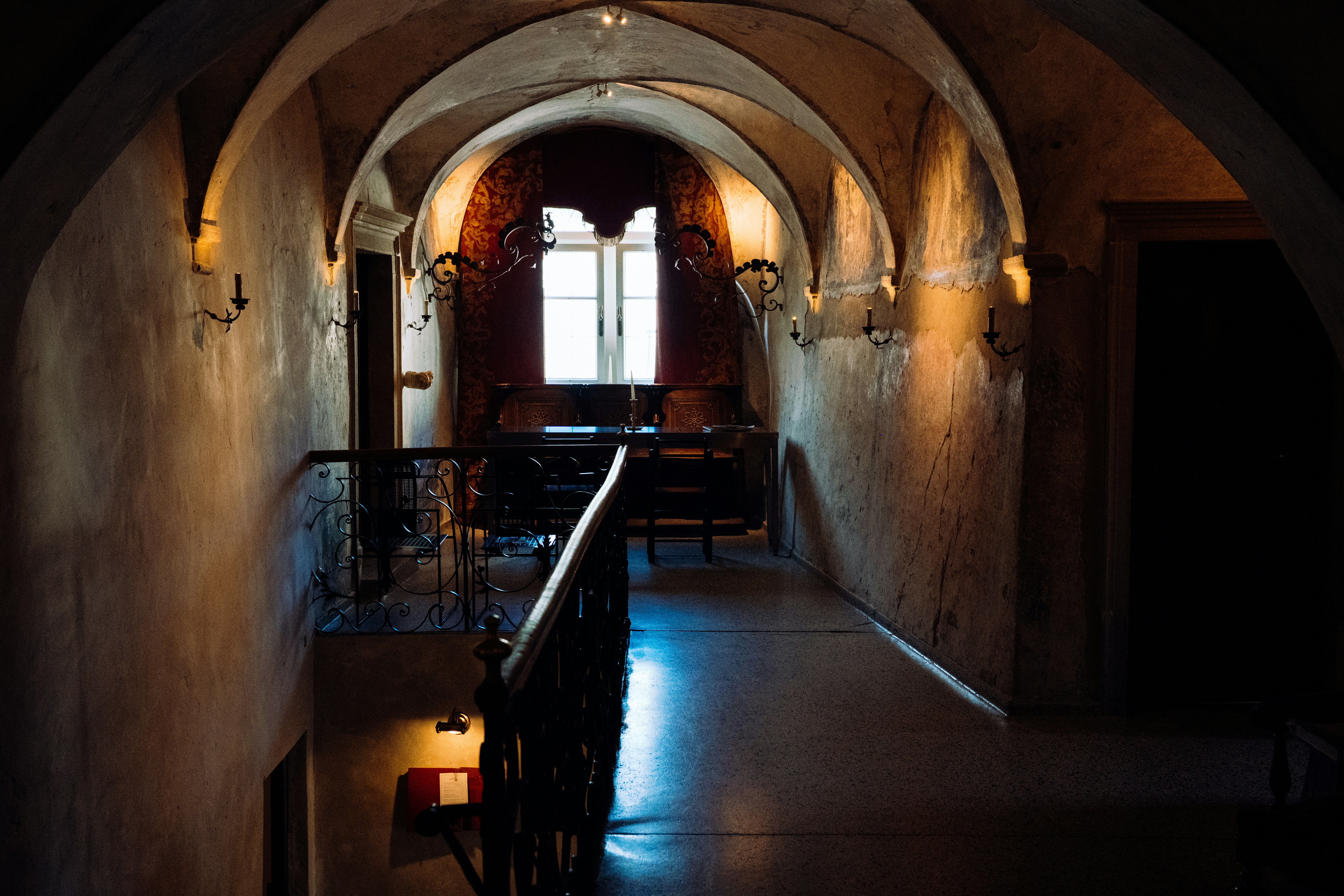Vaulted Corridor to a Windowed Choir Loft