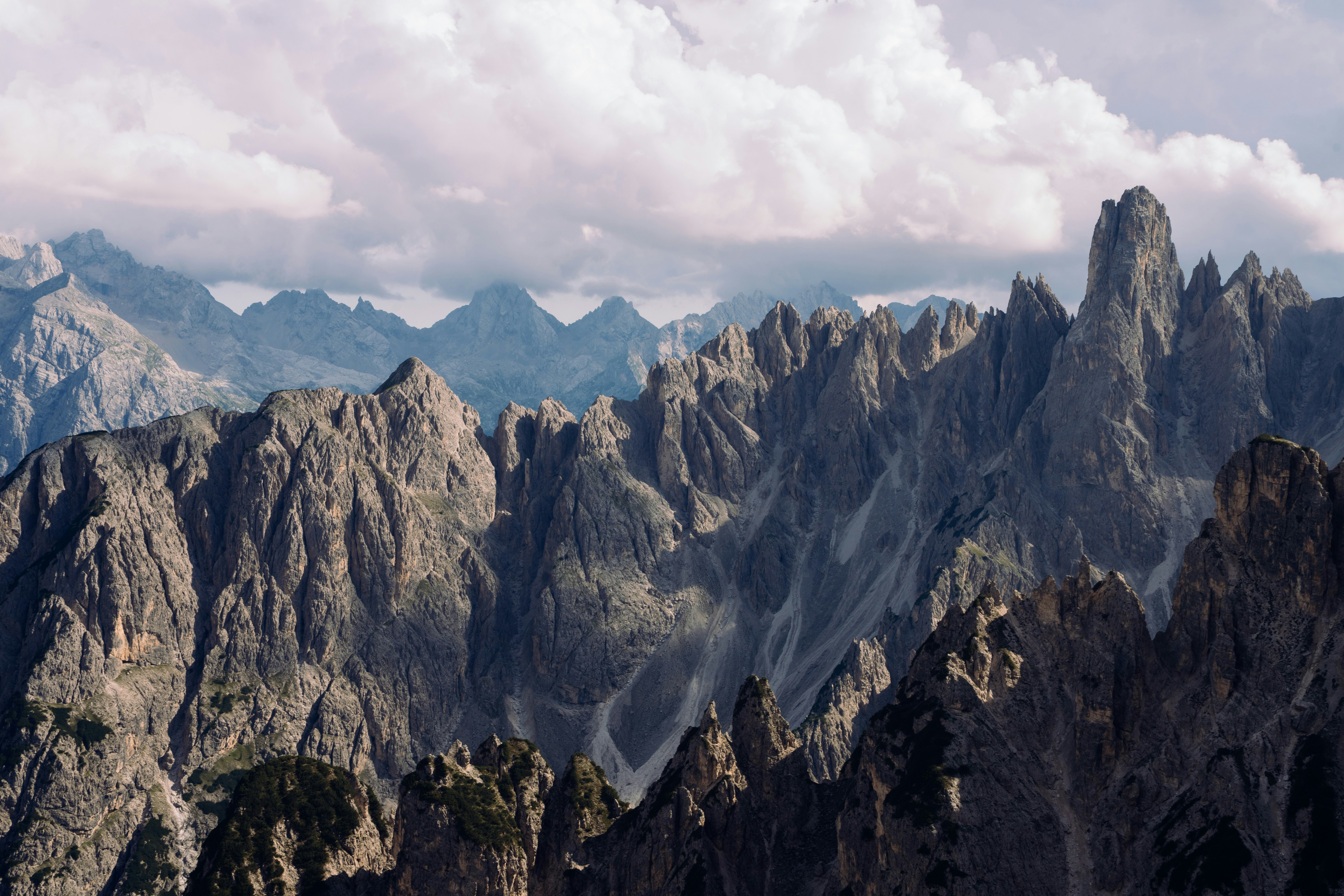 Earthen Spires Under a Veiled Sky