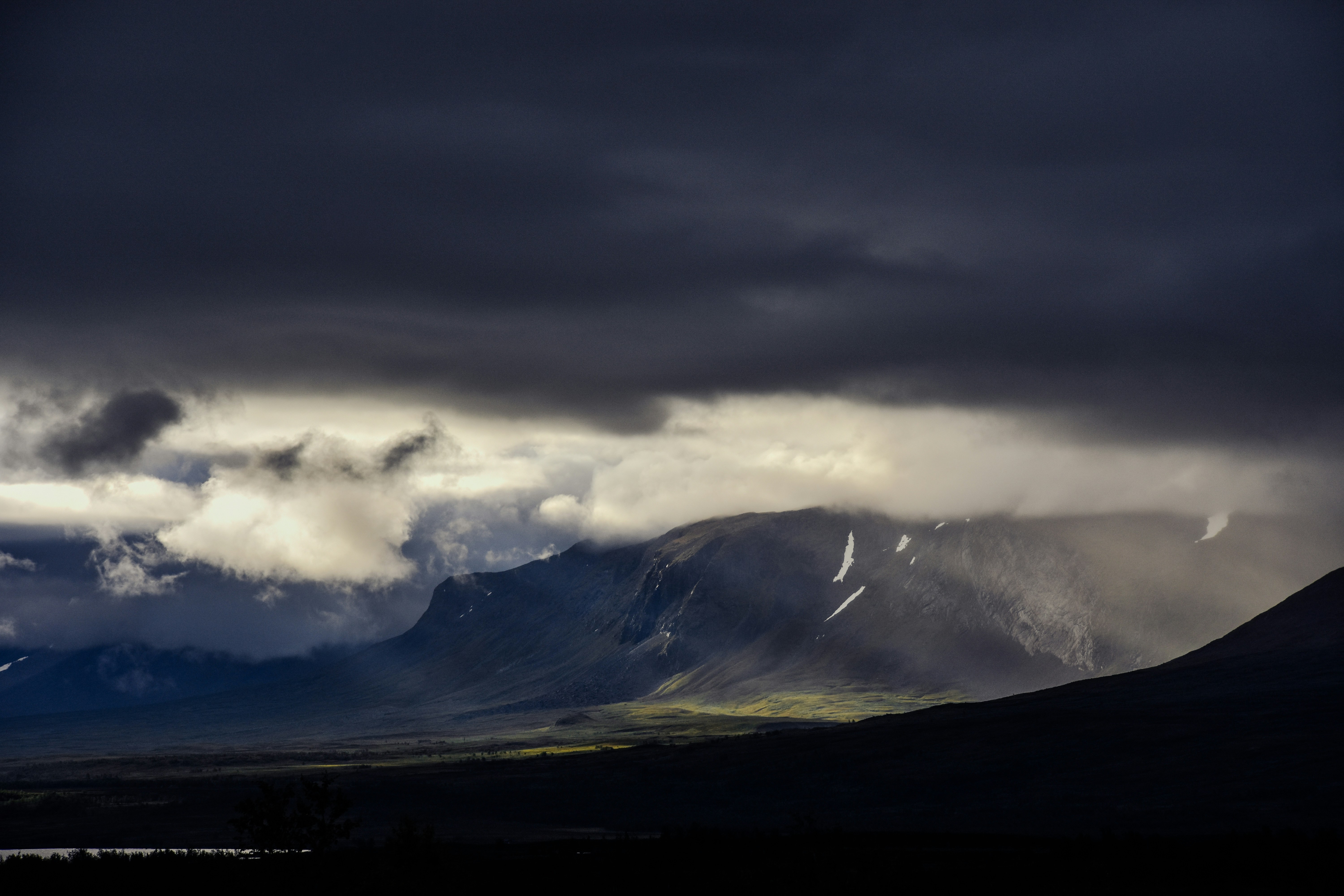 Midnight Pass over Shrouded Peaks