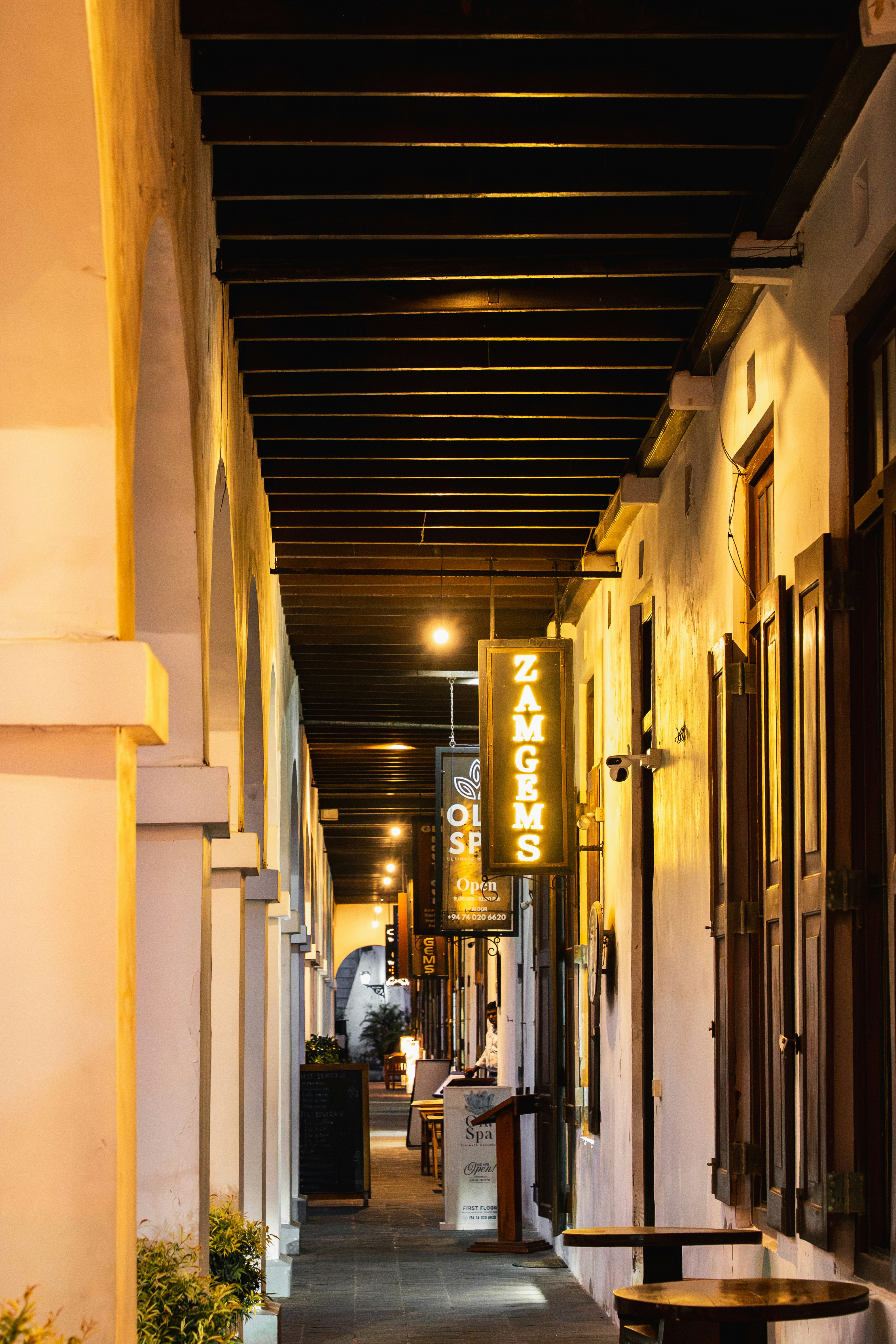 Neon Alley: A Warm Corridor of Doors and Light