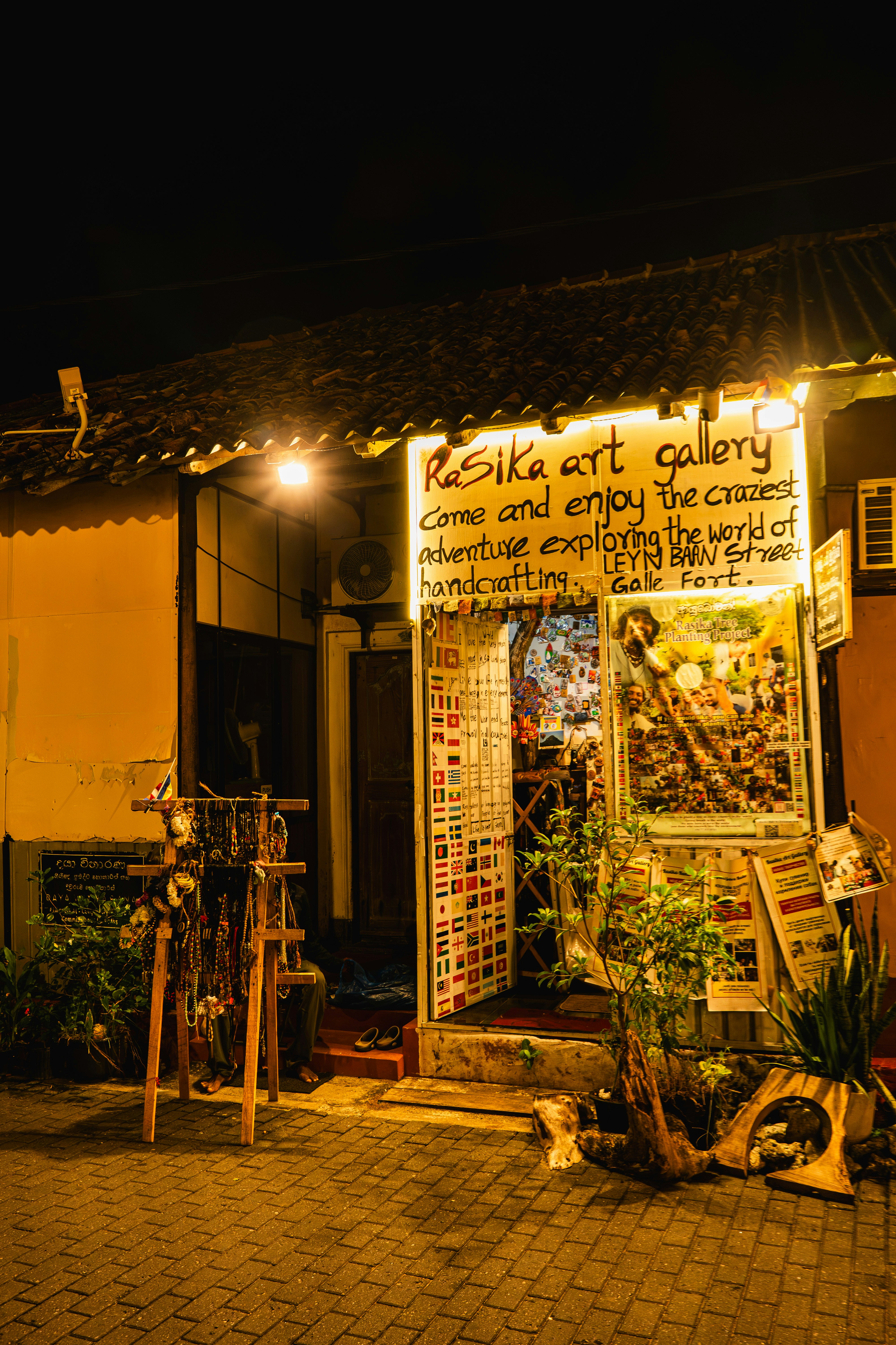 Warm Gallery Wake: A Nightfront of Colorful Art and Handcrafted Signs