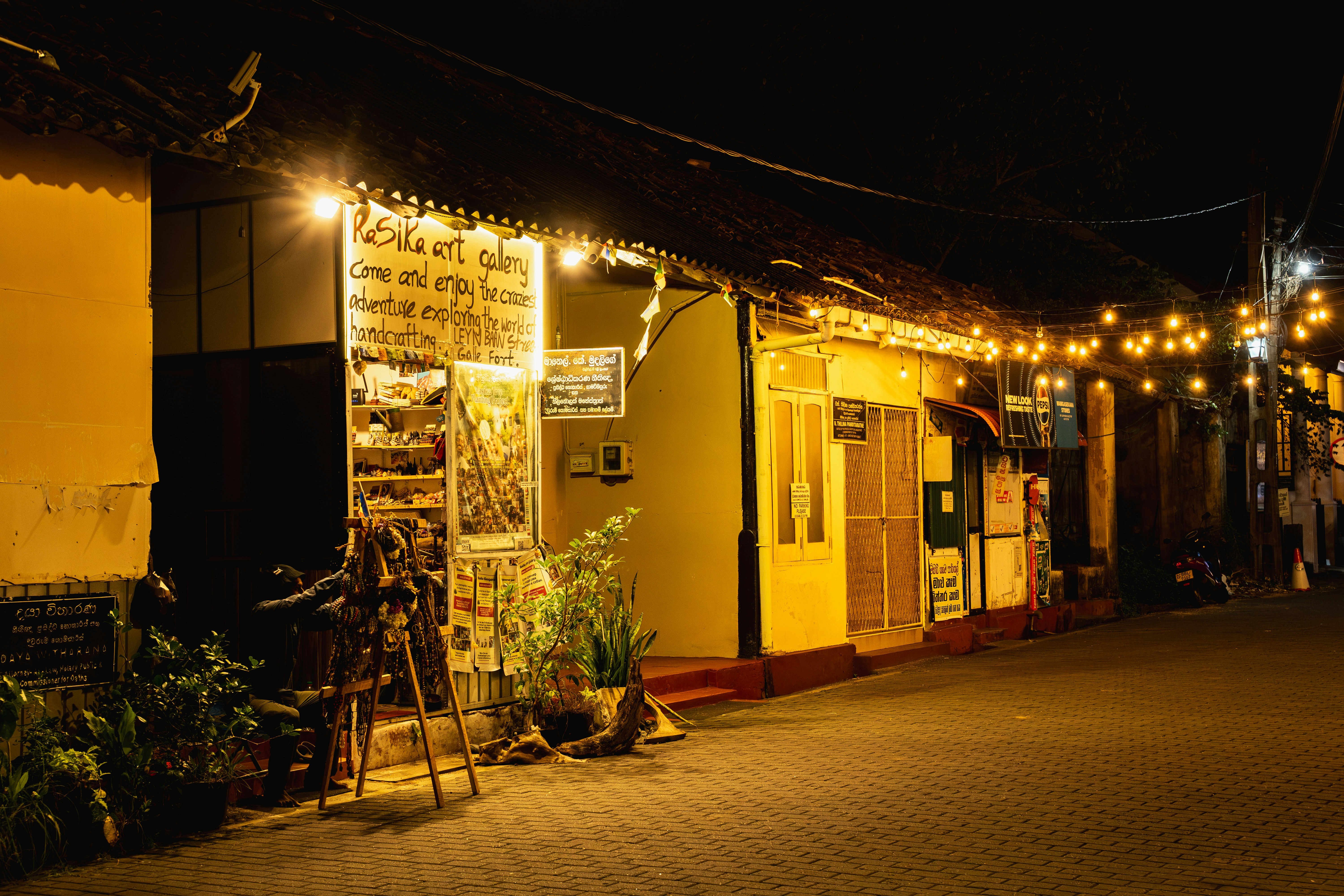 Warm Lanterns, Quiet Street: A Night in a Coastal Alley