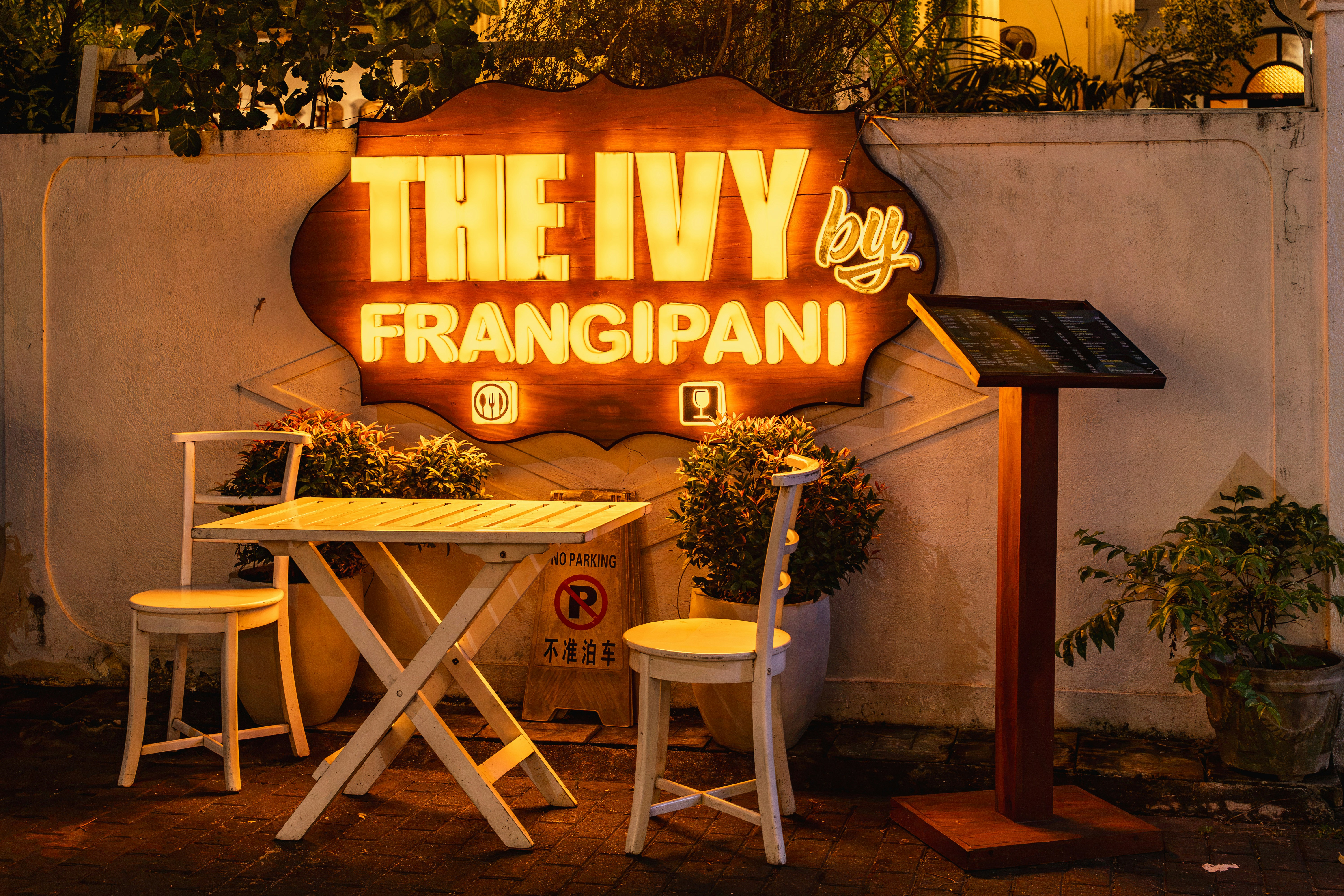 Neon Signage by The Ivy: Evening Dining Nook