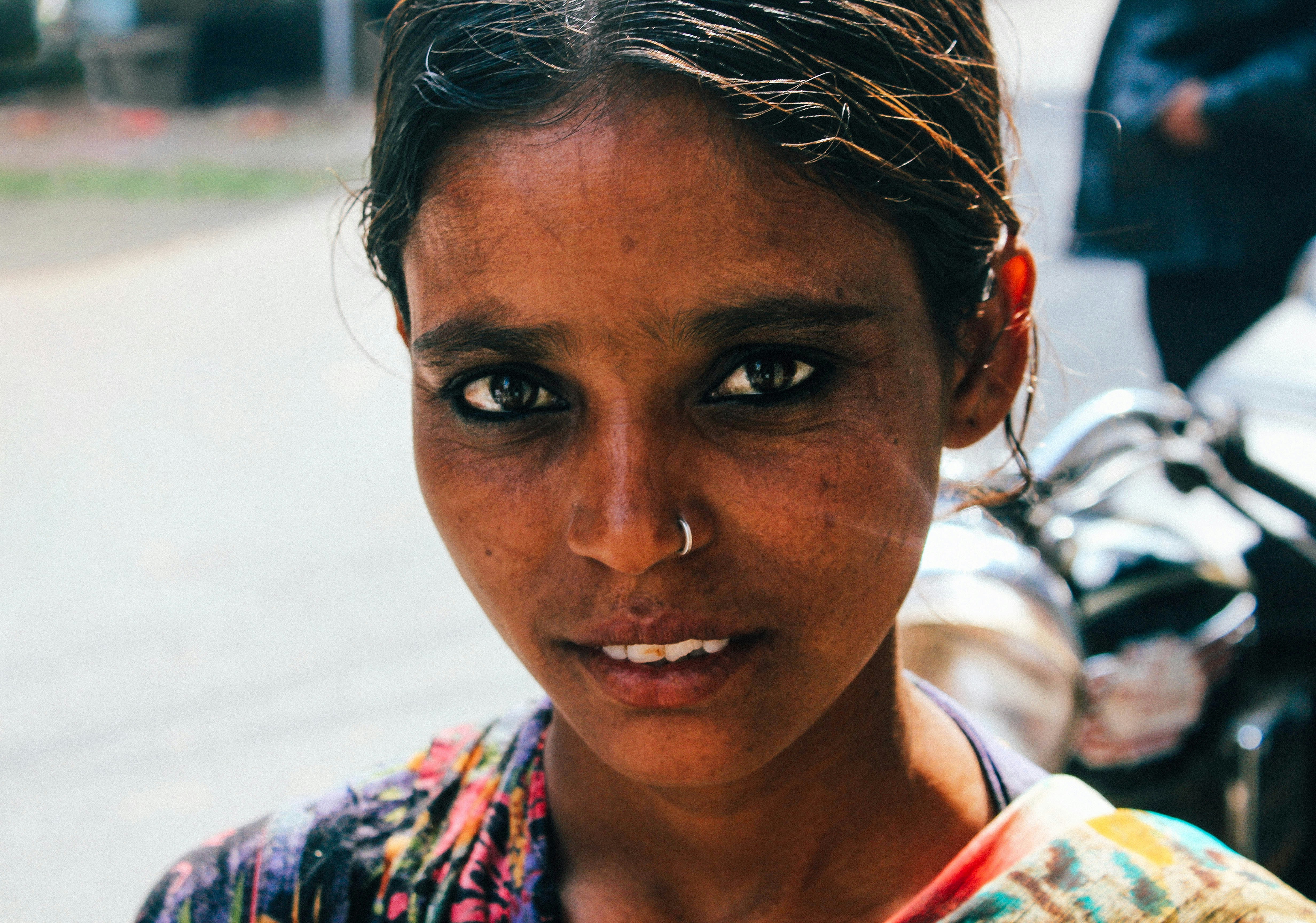Eyes in Focus: A Portrait of Resolve on a Sunlit Street