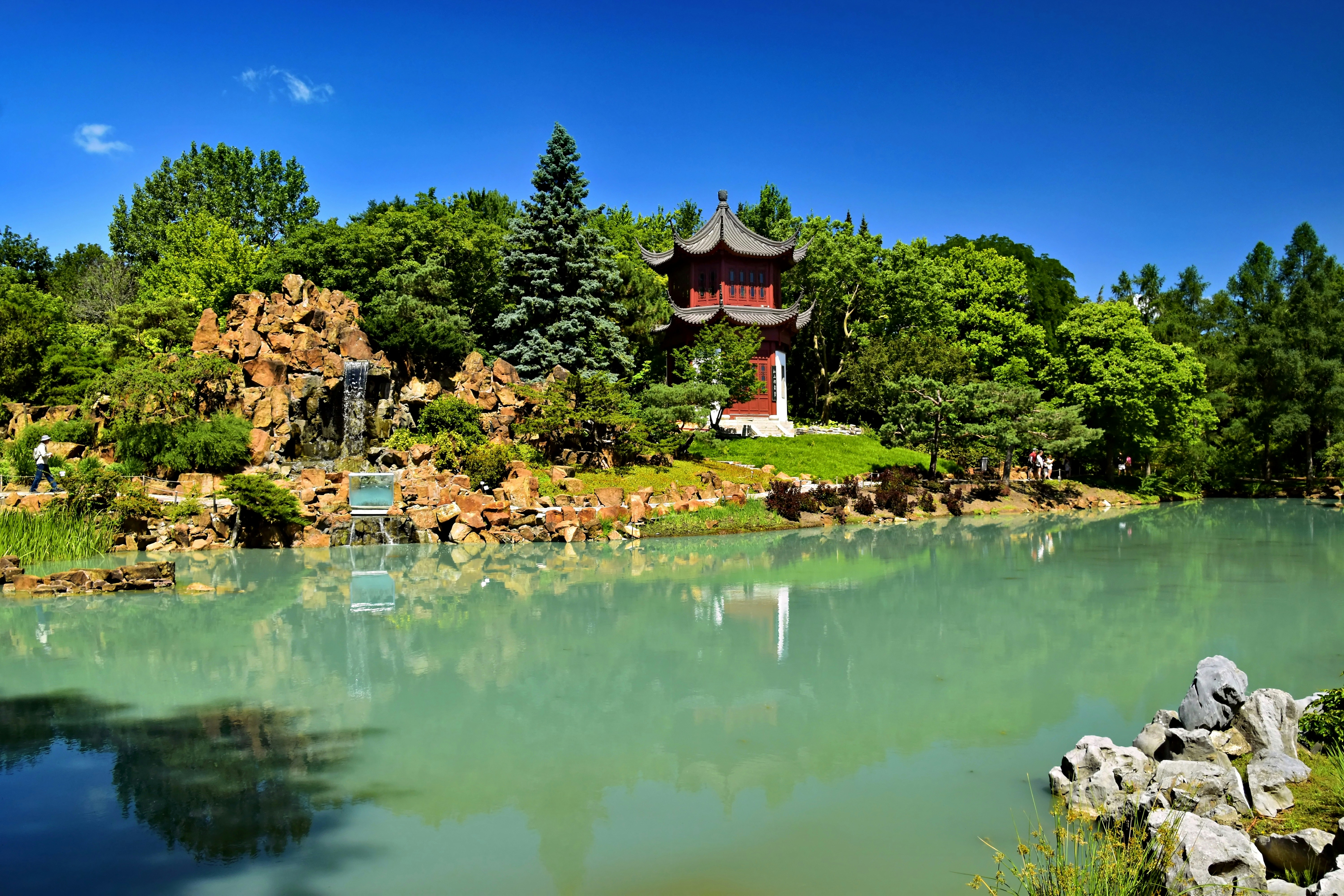 Serene Teahouse Overlooking a Misty Pond