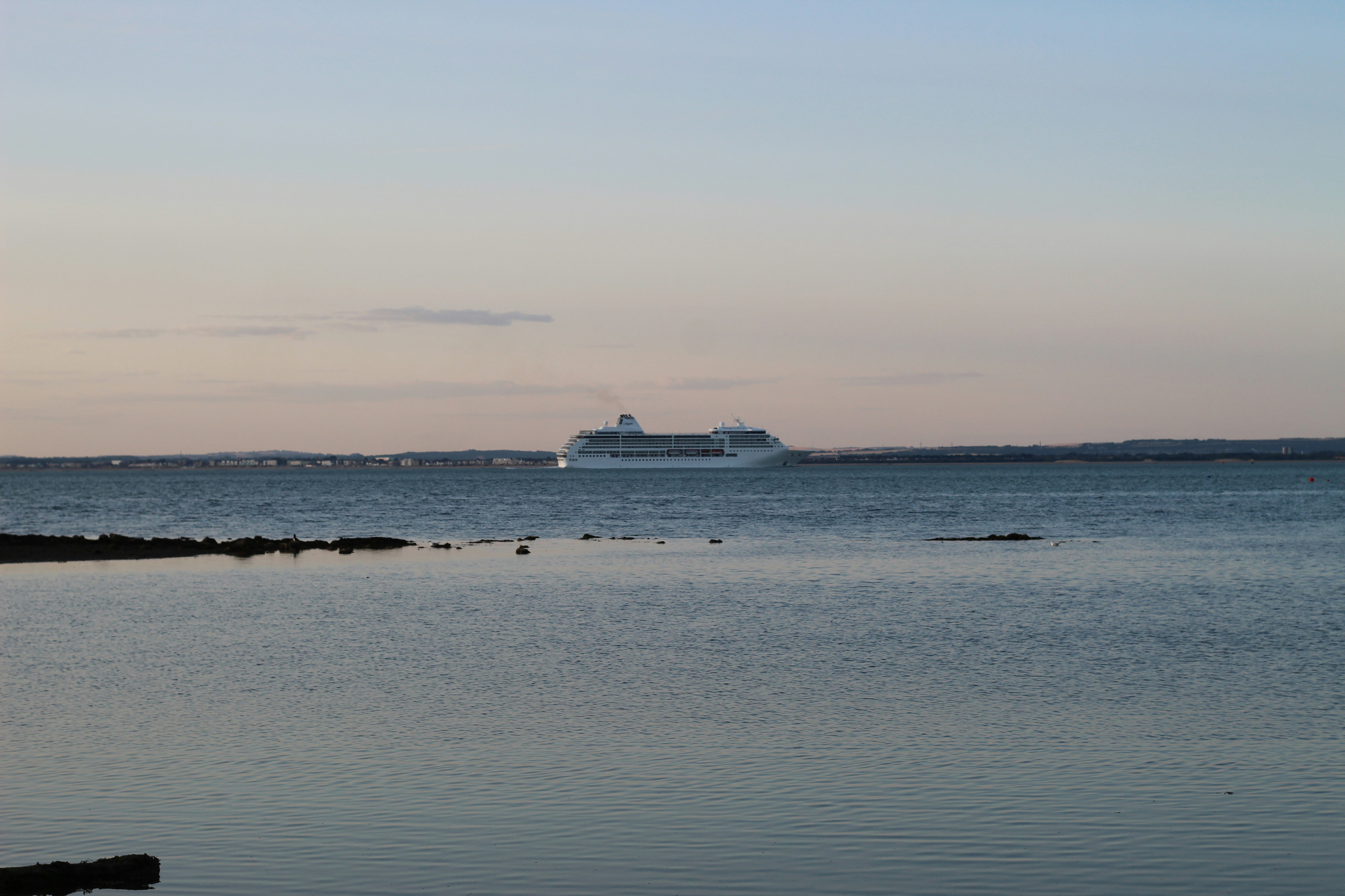 Silent Horizon: A distant cruise on calm sea