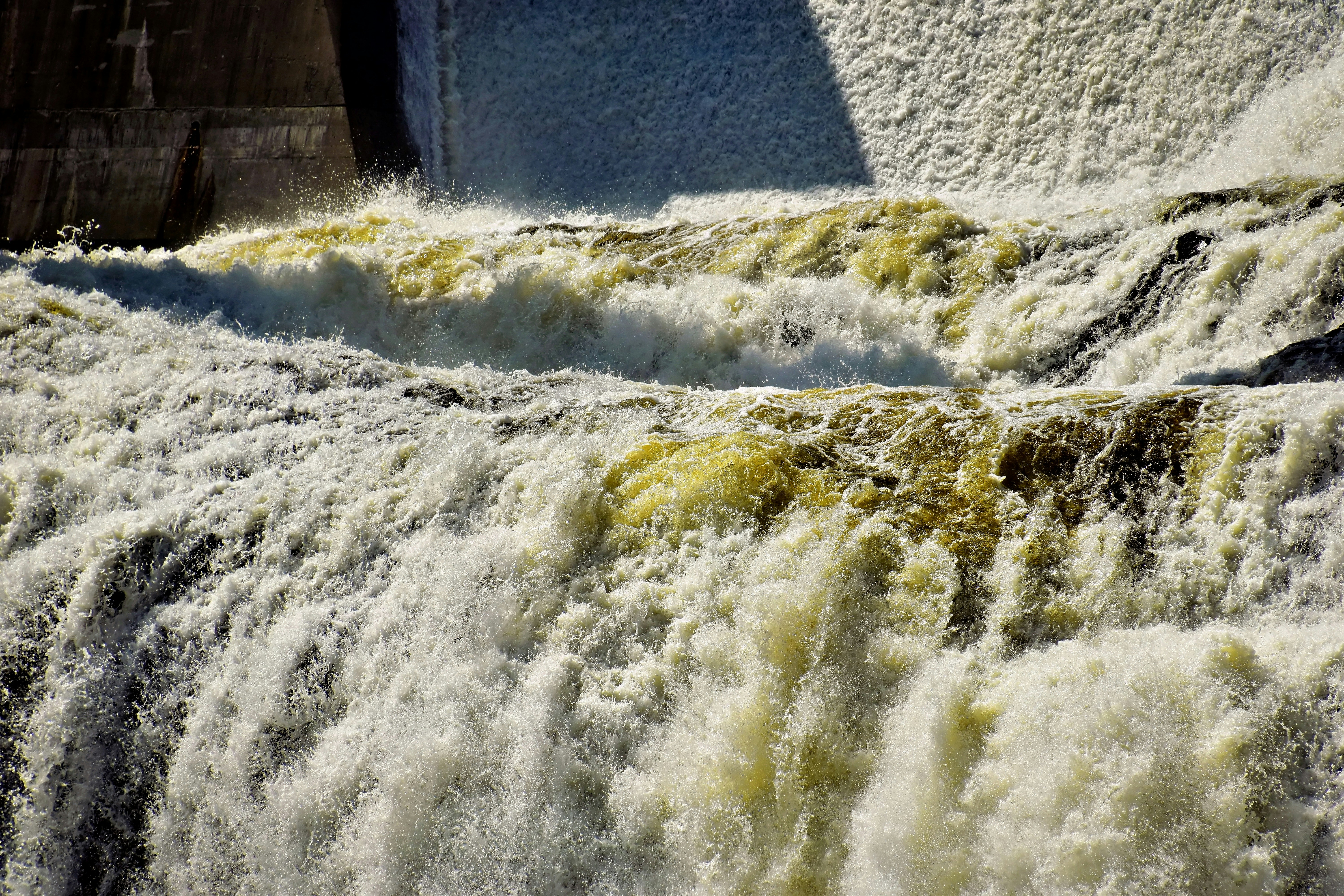 Cascade Over Concrete: Textured Flow at Dusk