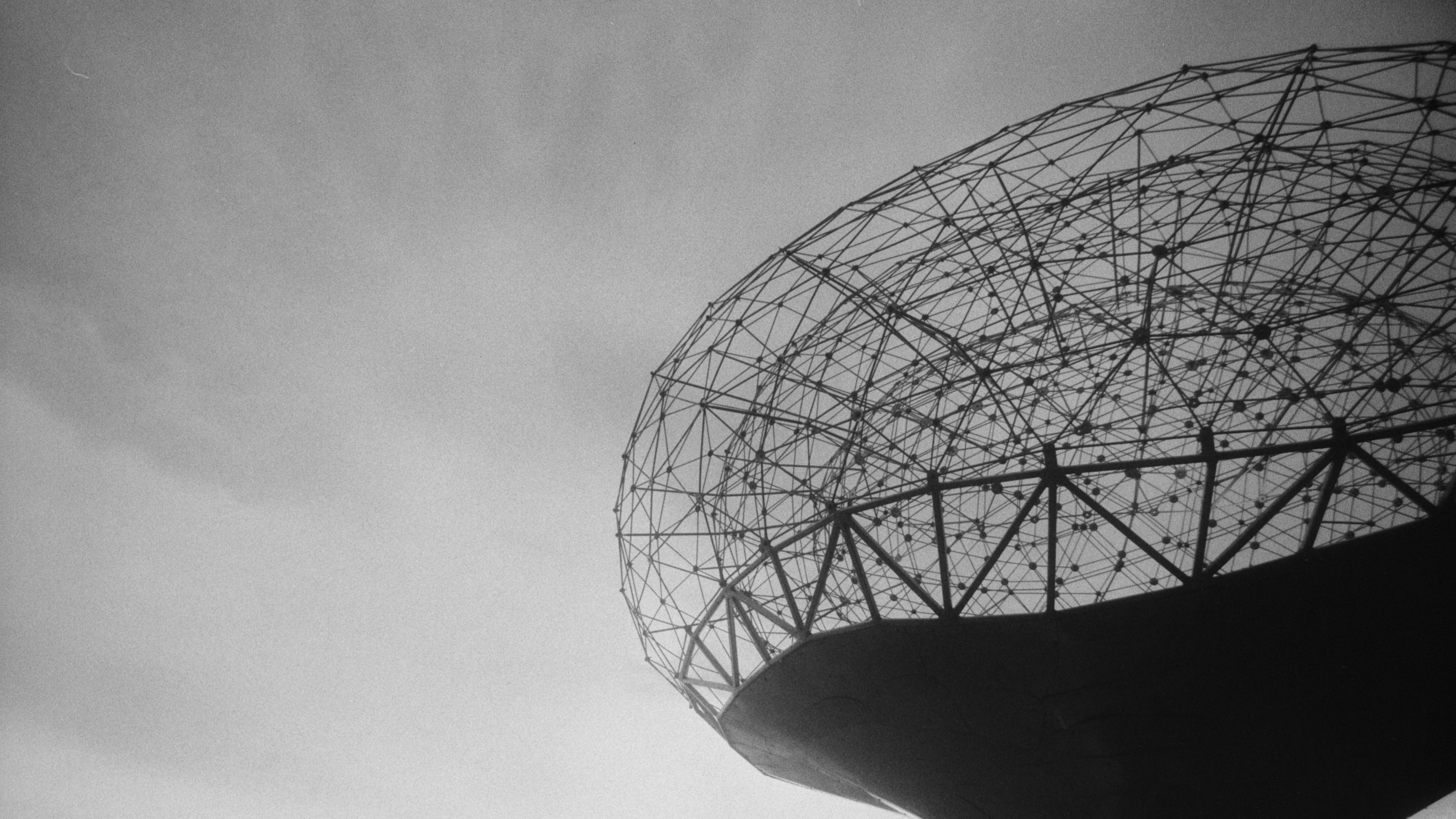 Geometric Sentinel: The Radio Dish in Monochrome