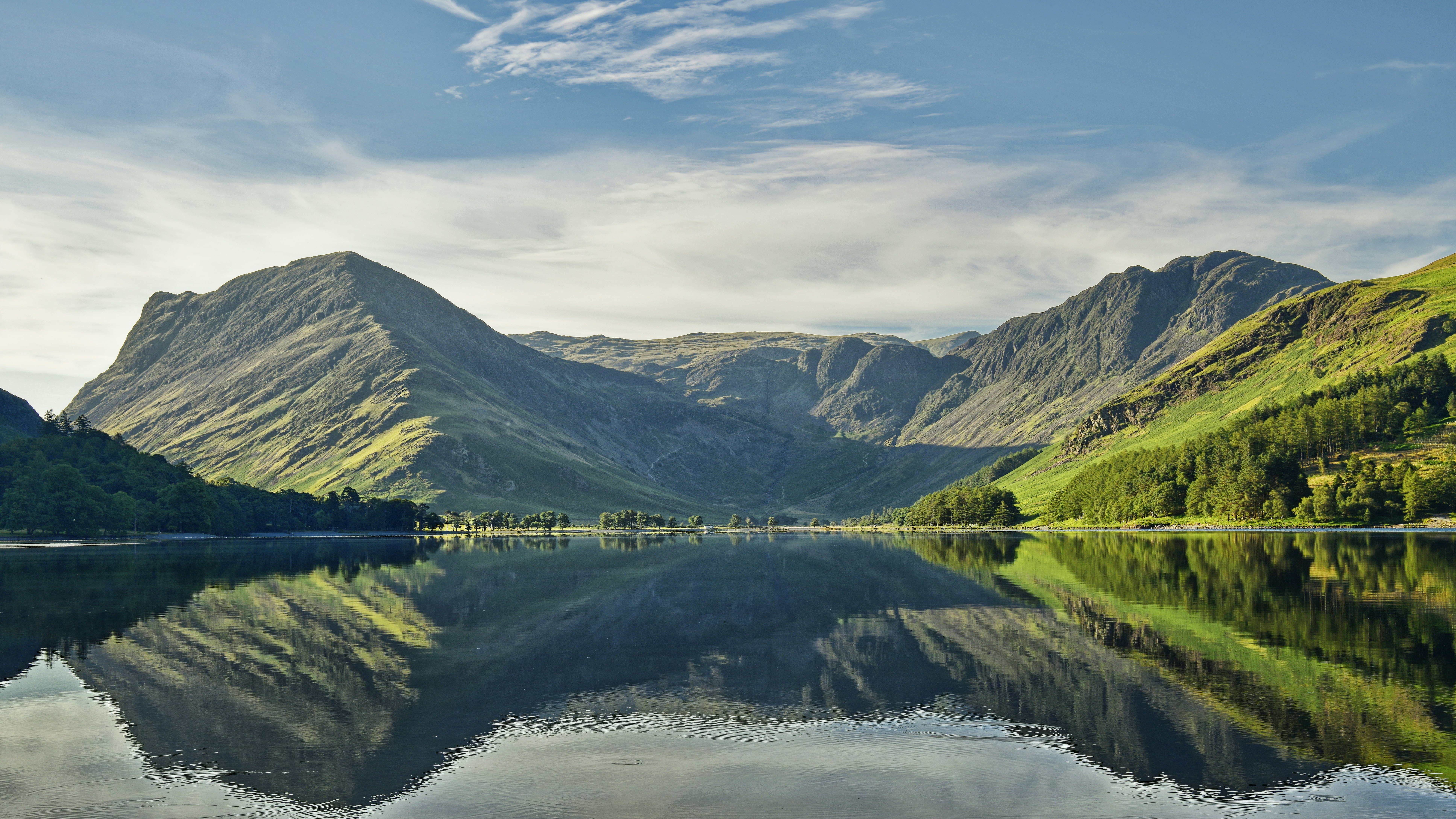 Azure Mirror: Mountain Mirror on a Glassy Fjord