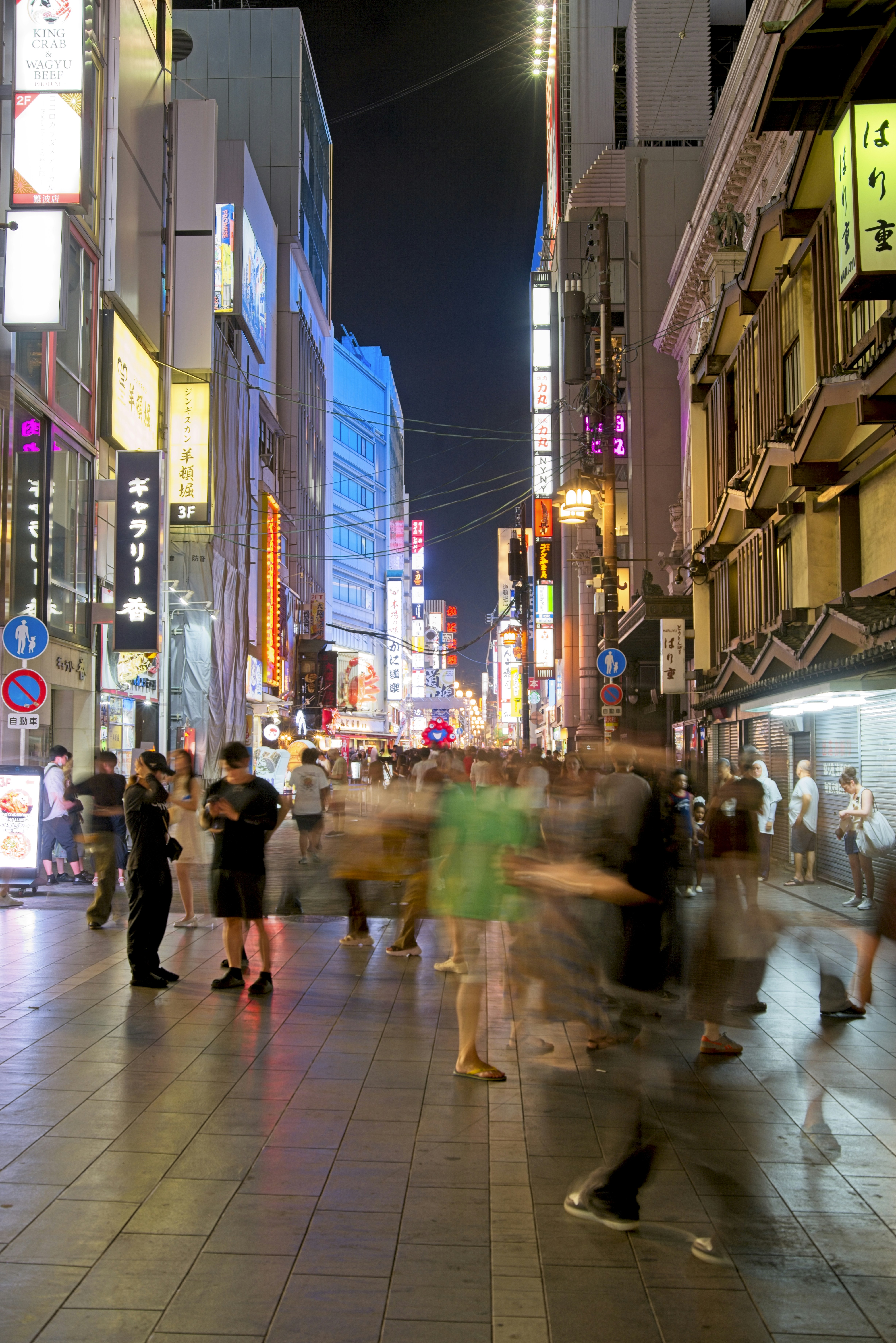 Neon Night Pulse: Pedestrians Blur Through Shimmering Shinjuku Street