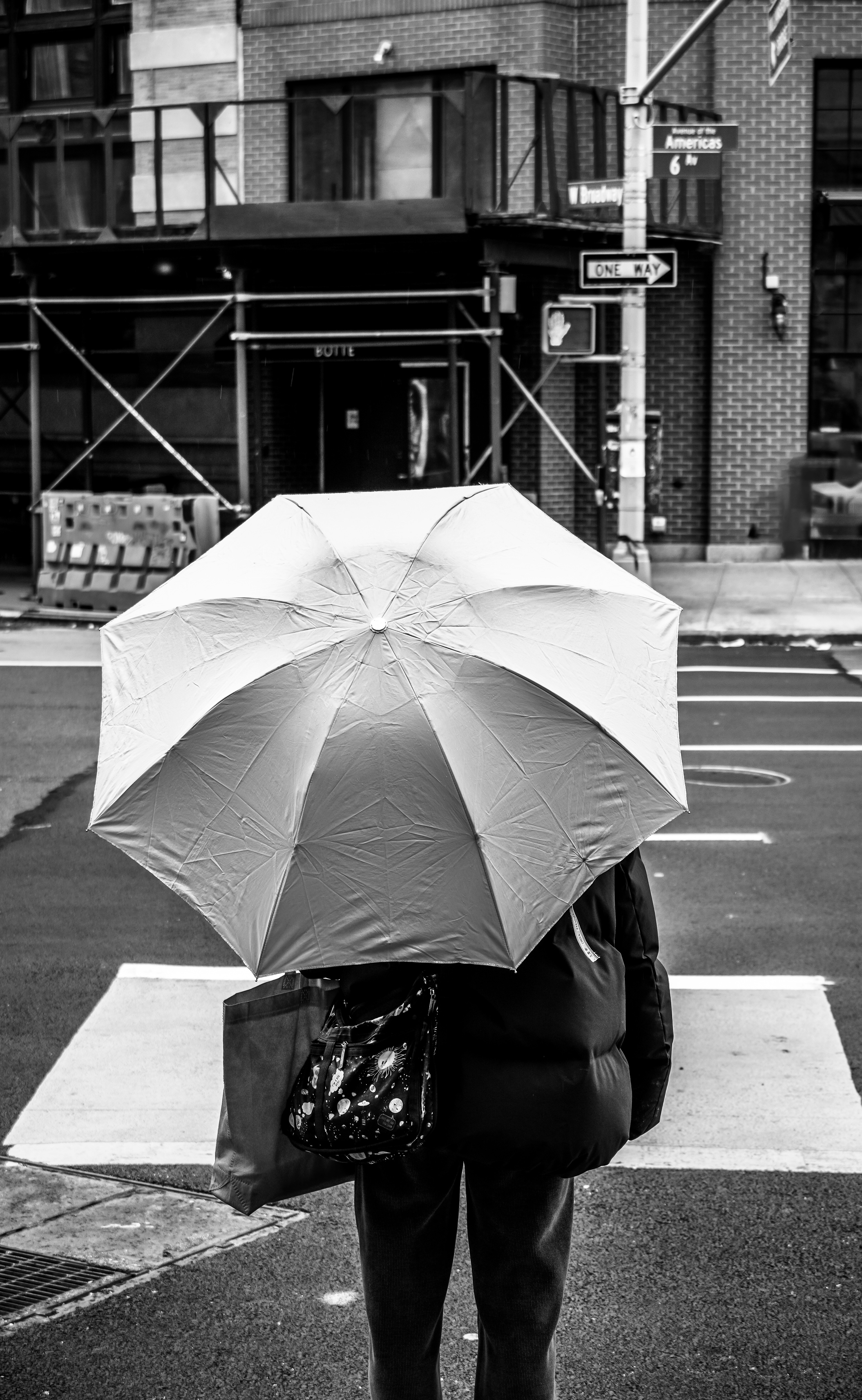 Urban Quiet Under a White Umbrella