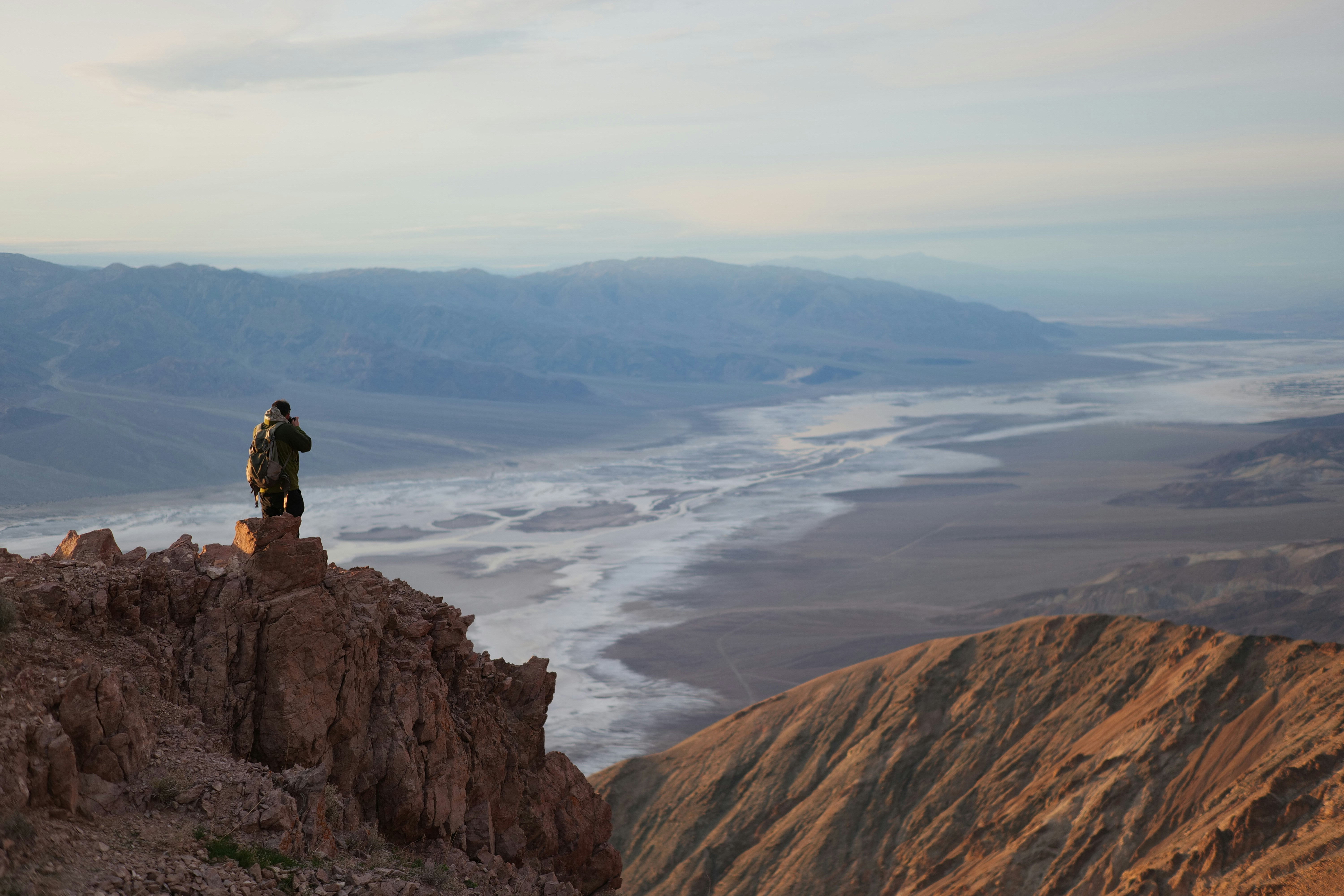 Lone Sentinel on a Serrated Ridge Over a Desert Sea