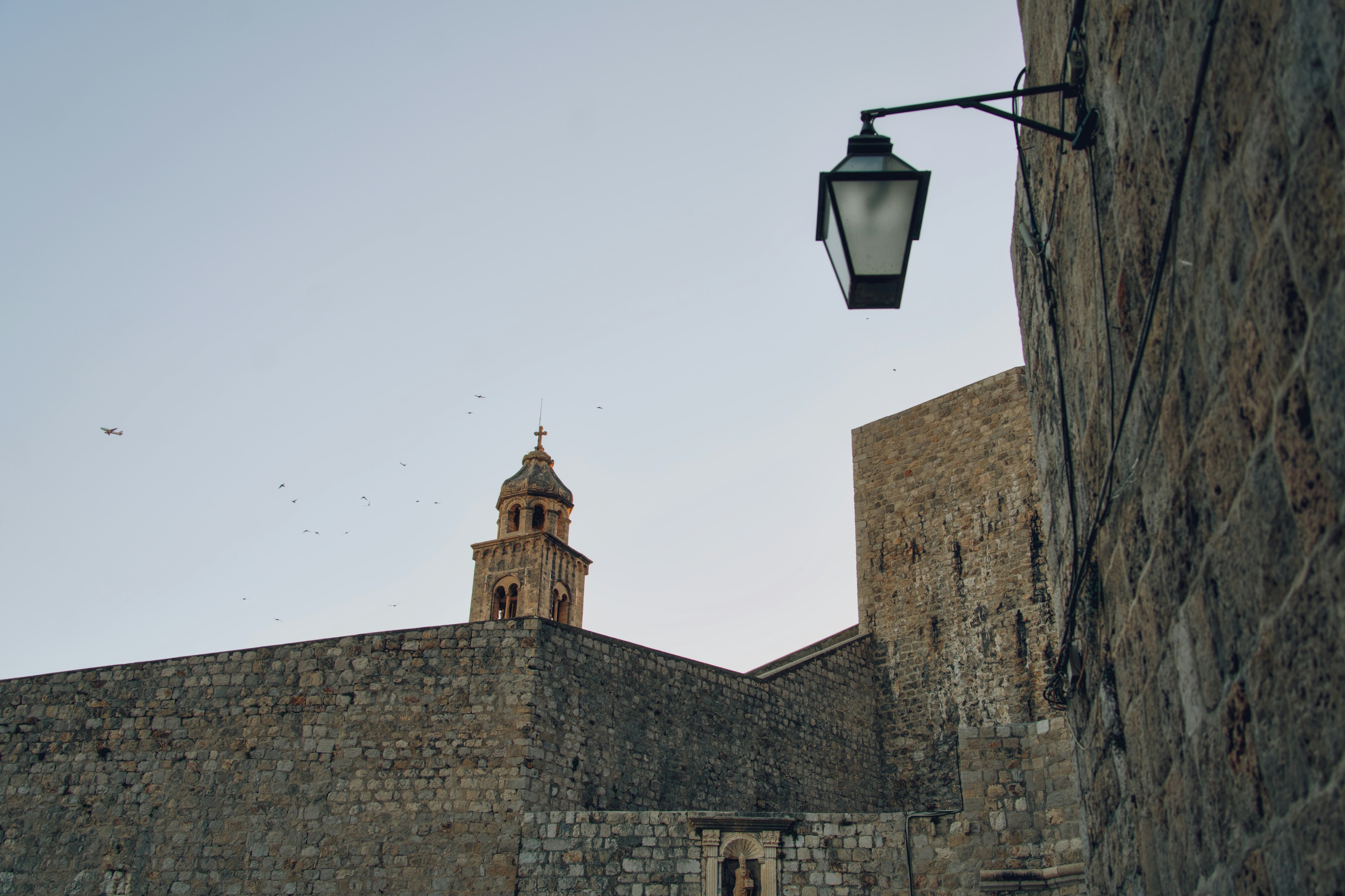 Stone Fortress and Lantern: A Quiet Corner of an Old Town