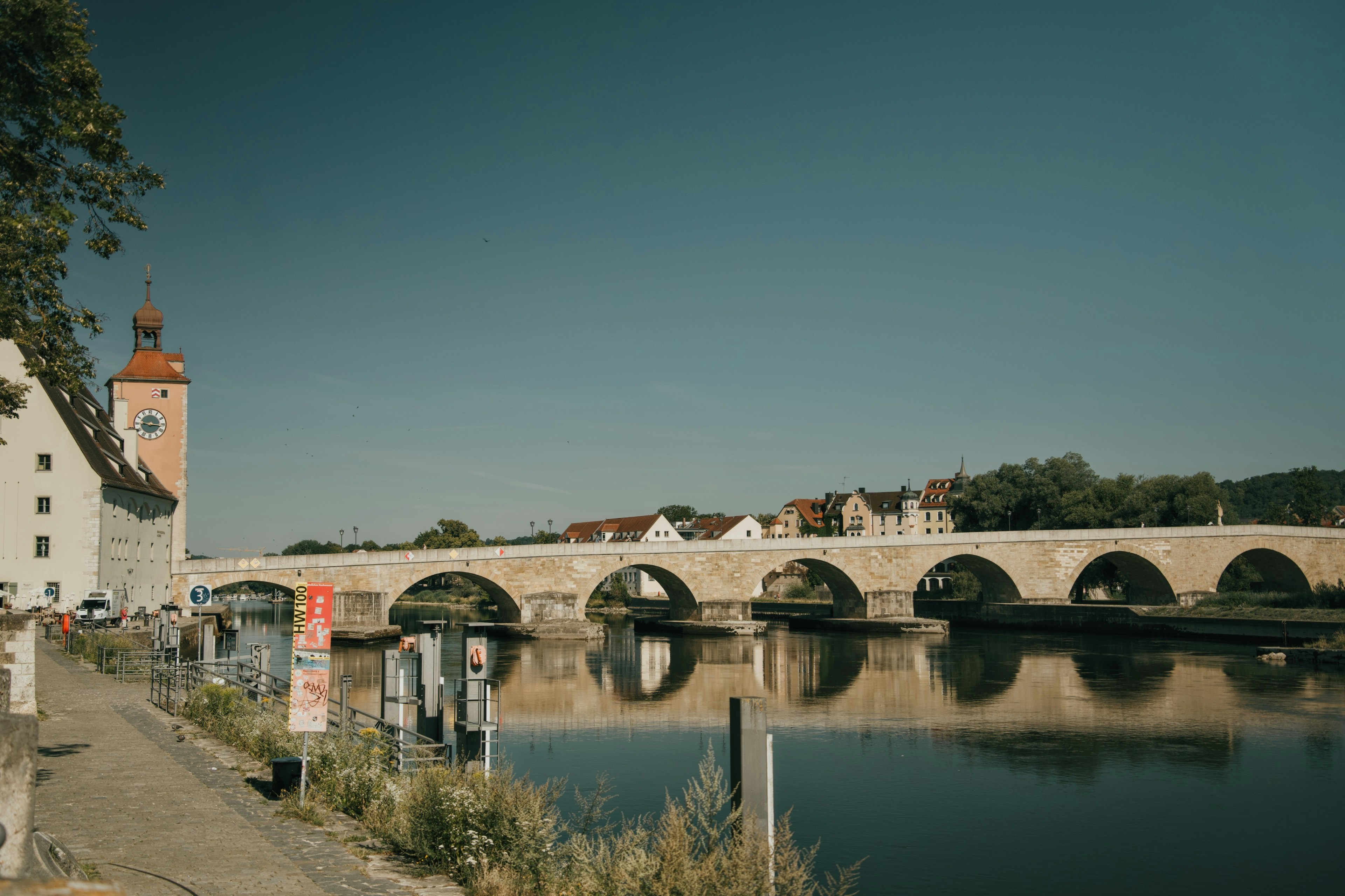 Bridge of Quiet Echoes Over a Riverside Town