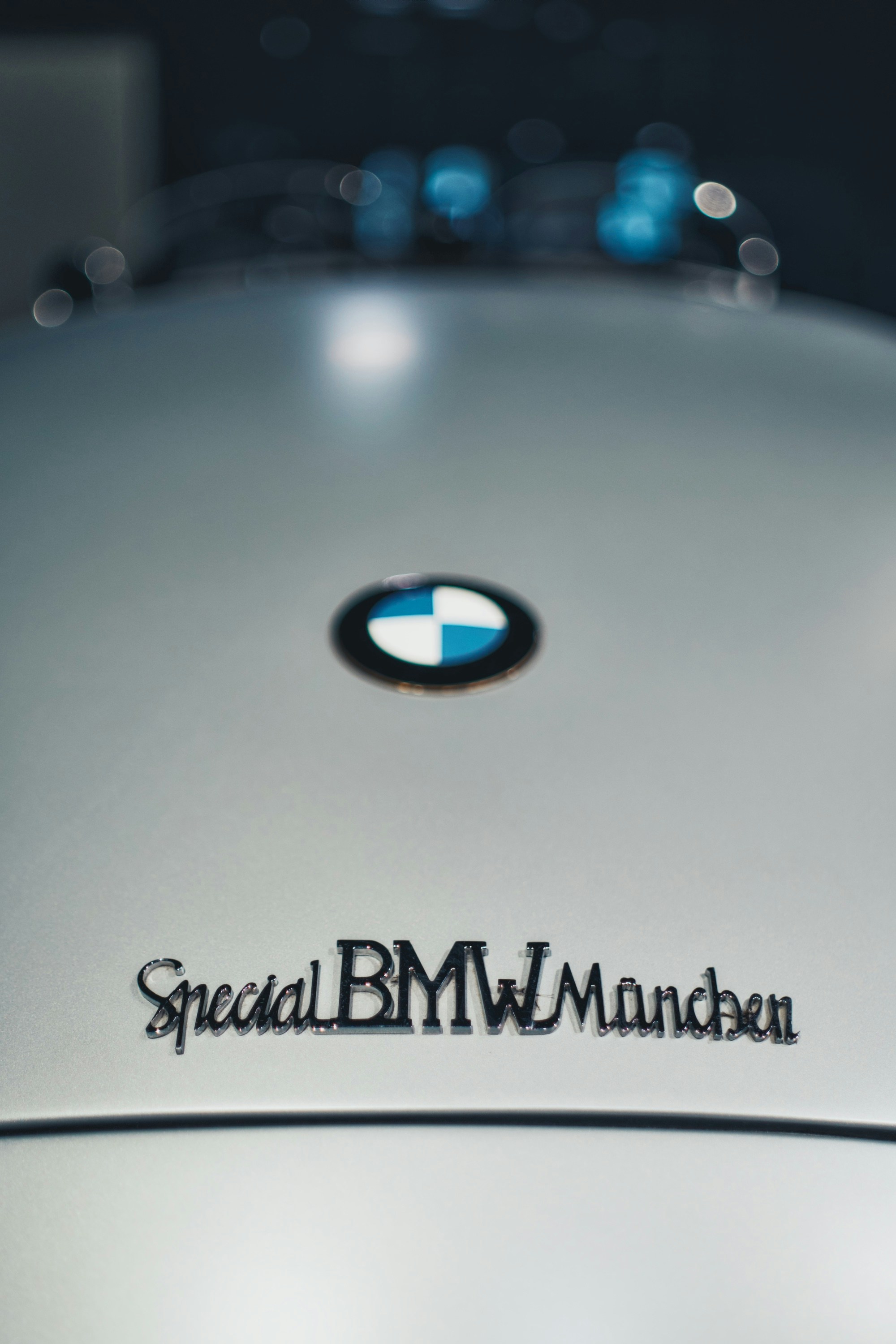 Signature BMW Emblem: A Close-Up of Prestige at the Engine Hood