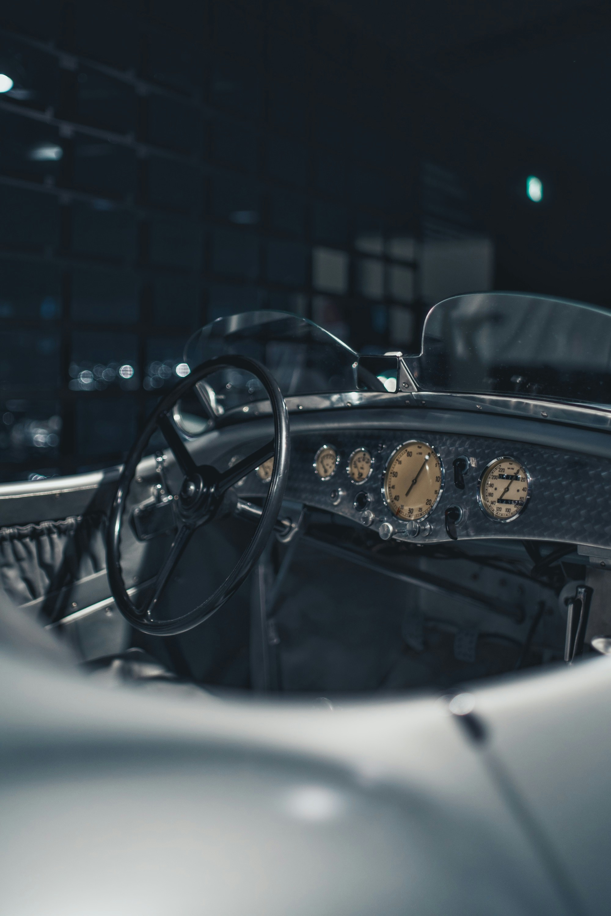 Cockpit of Time: A Vintage Car’s Dials in Low Light