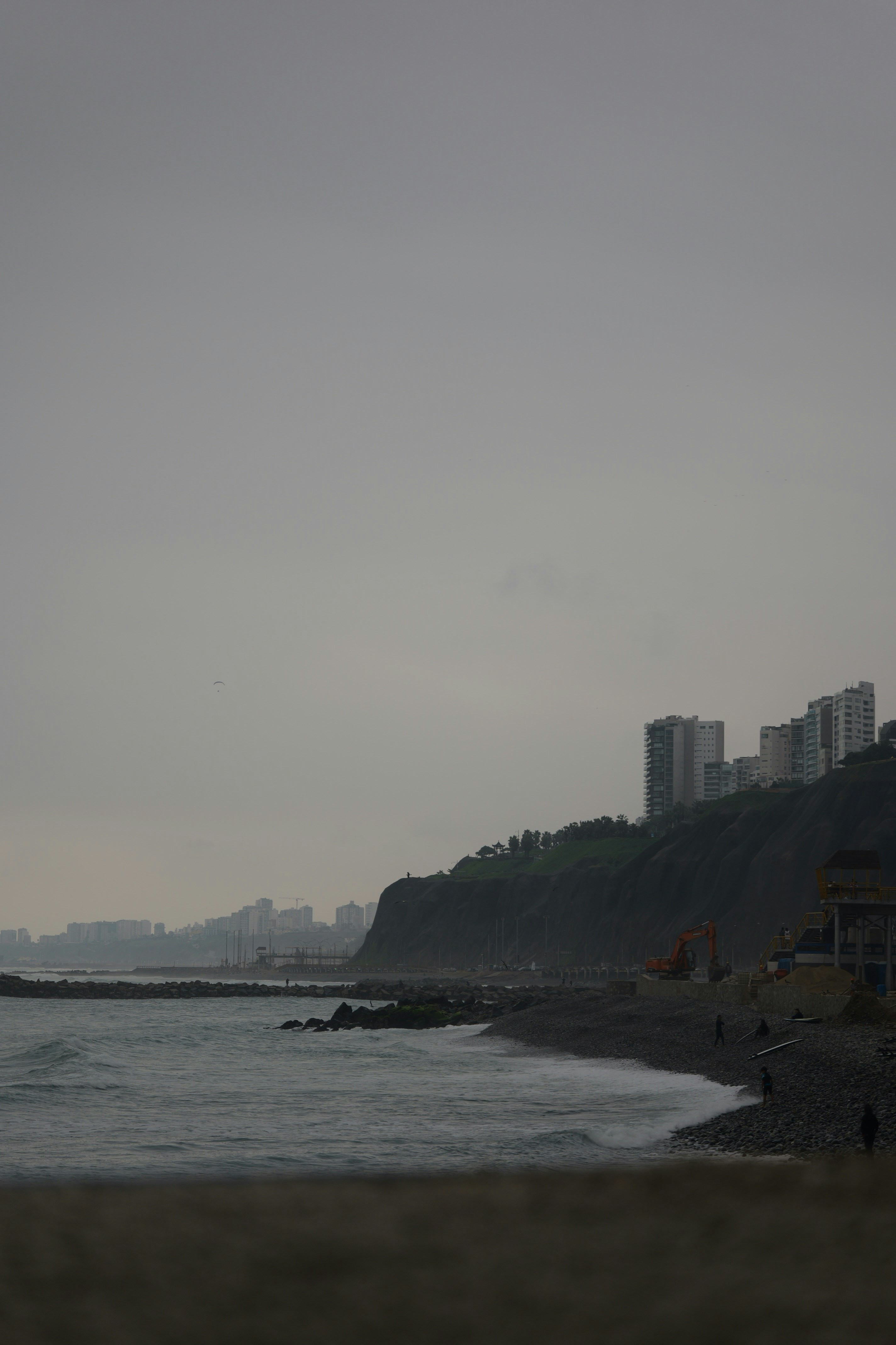 Coastal Silhouette: Cliffside Skyline at Dusk