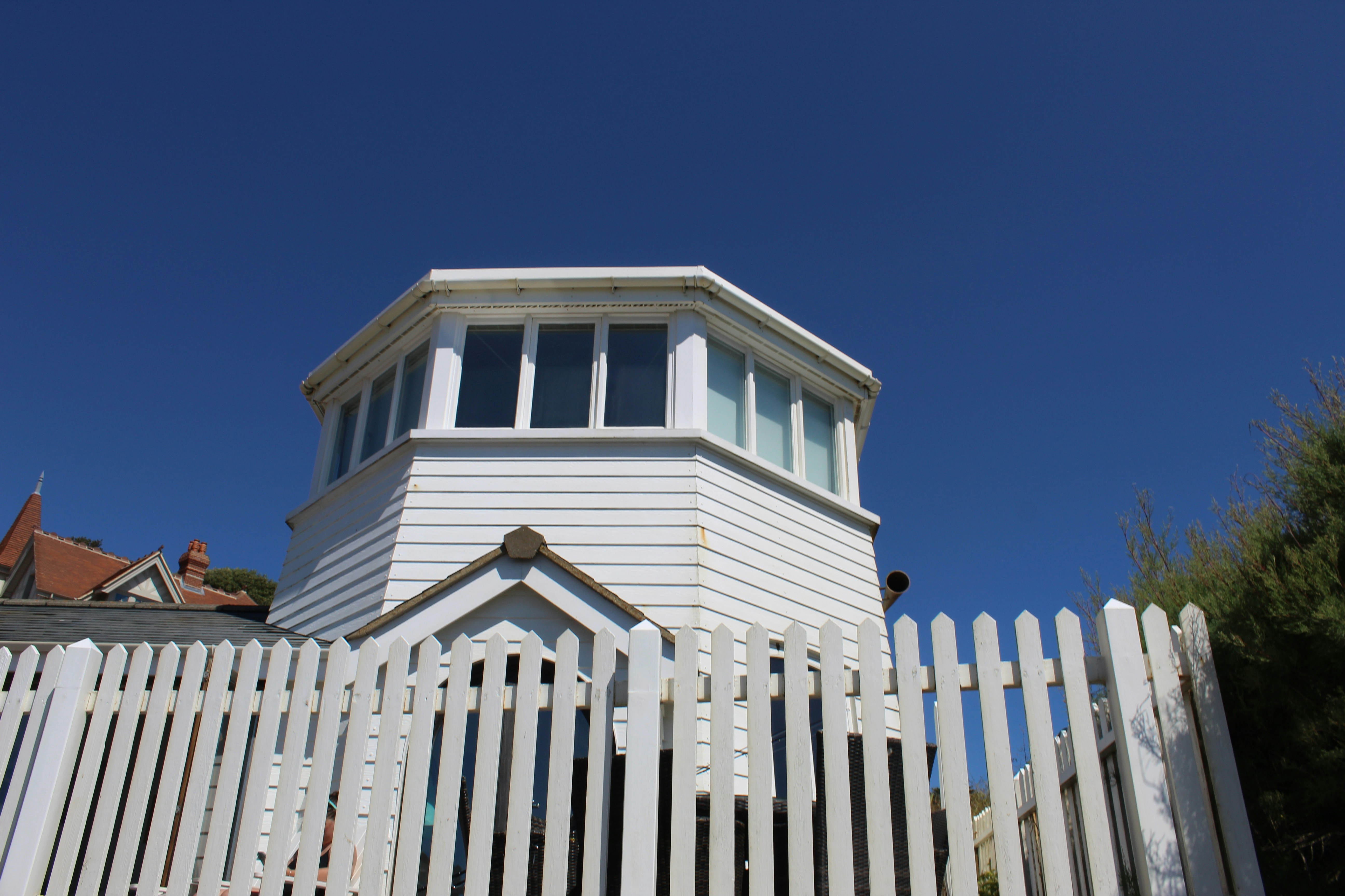 Watchtower Above the White Fence