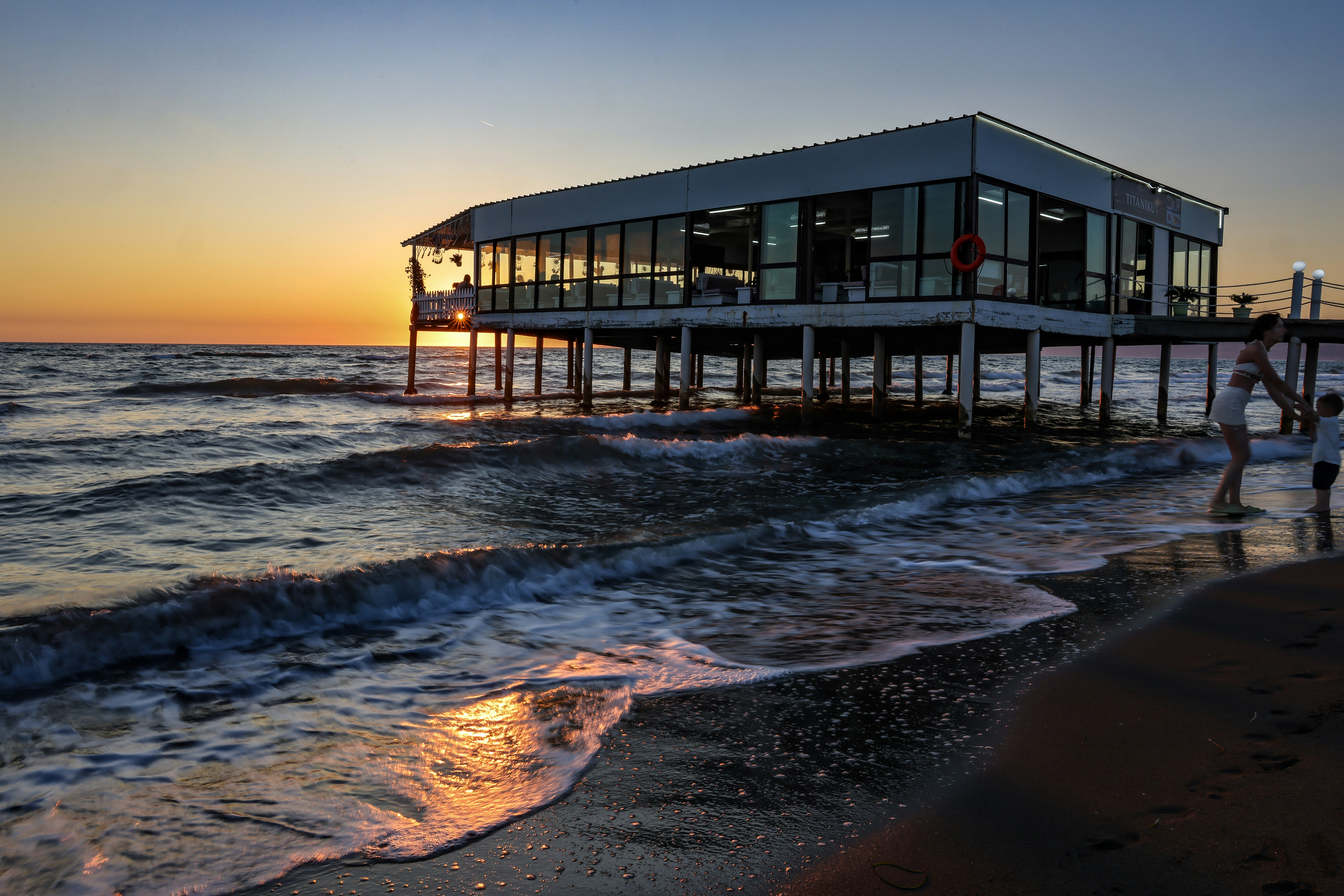 Sunset Pier: Pavillion Over Waves