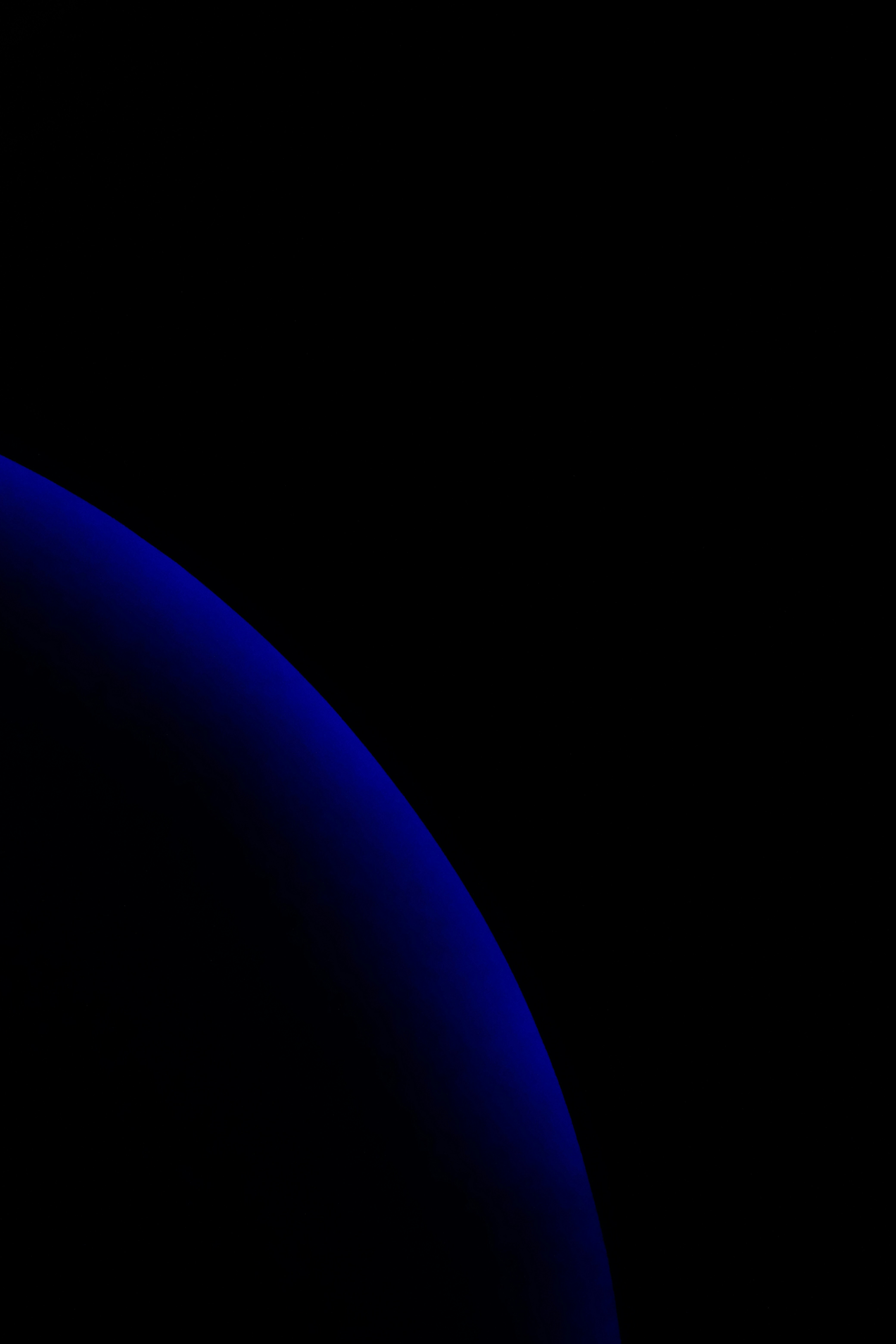 Blue Crescent Over Black Void