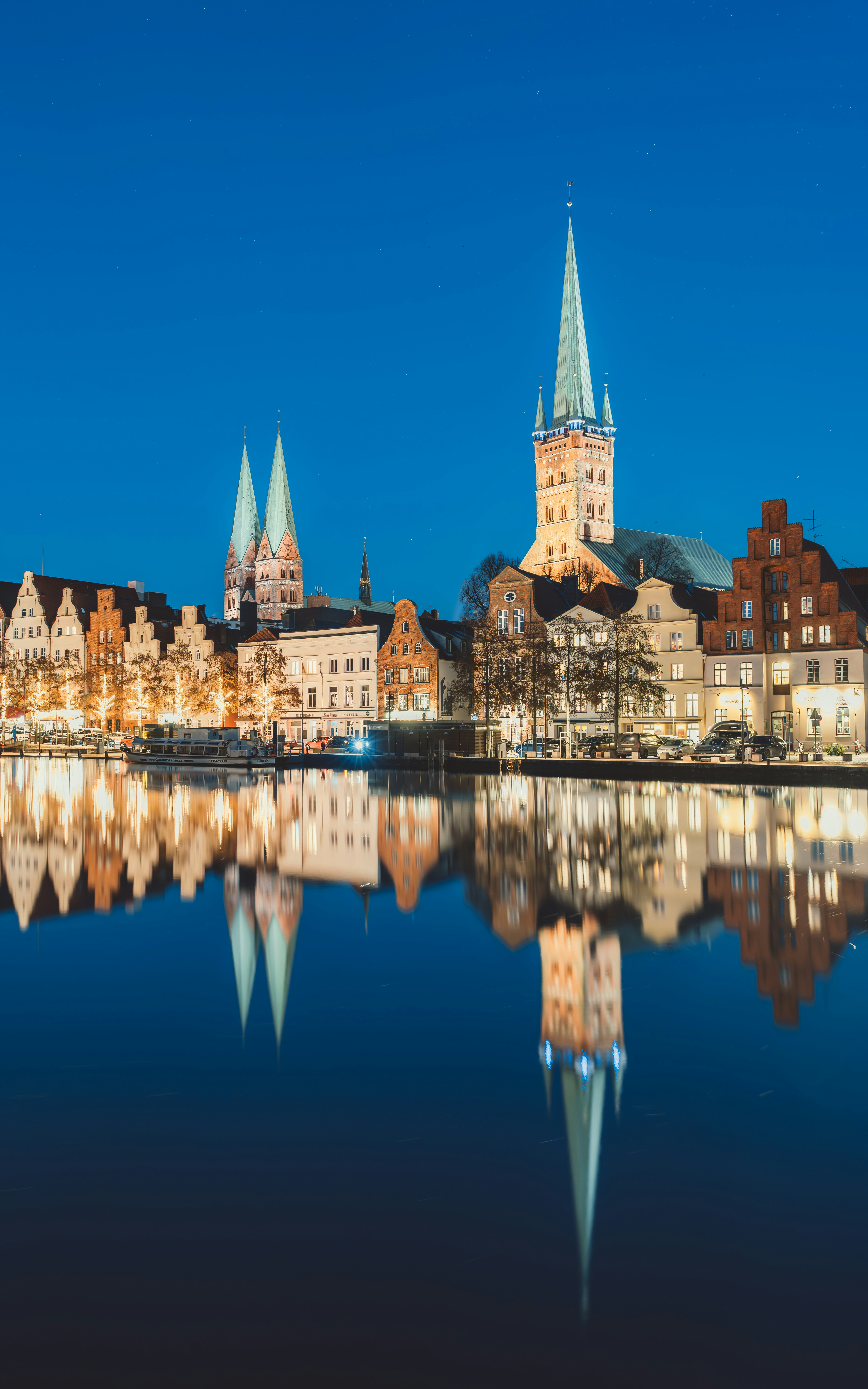 Midnight Cathedral Reflections Over Nordic Waters
