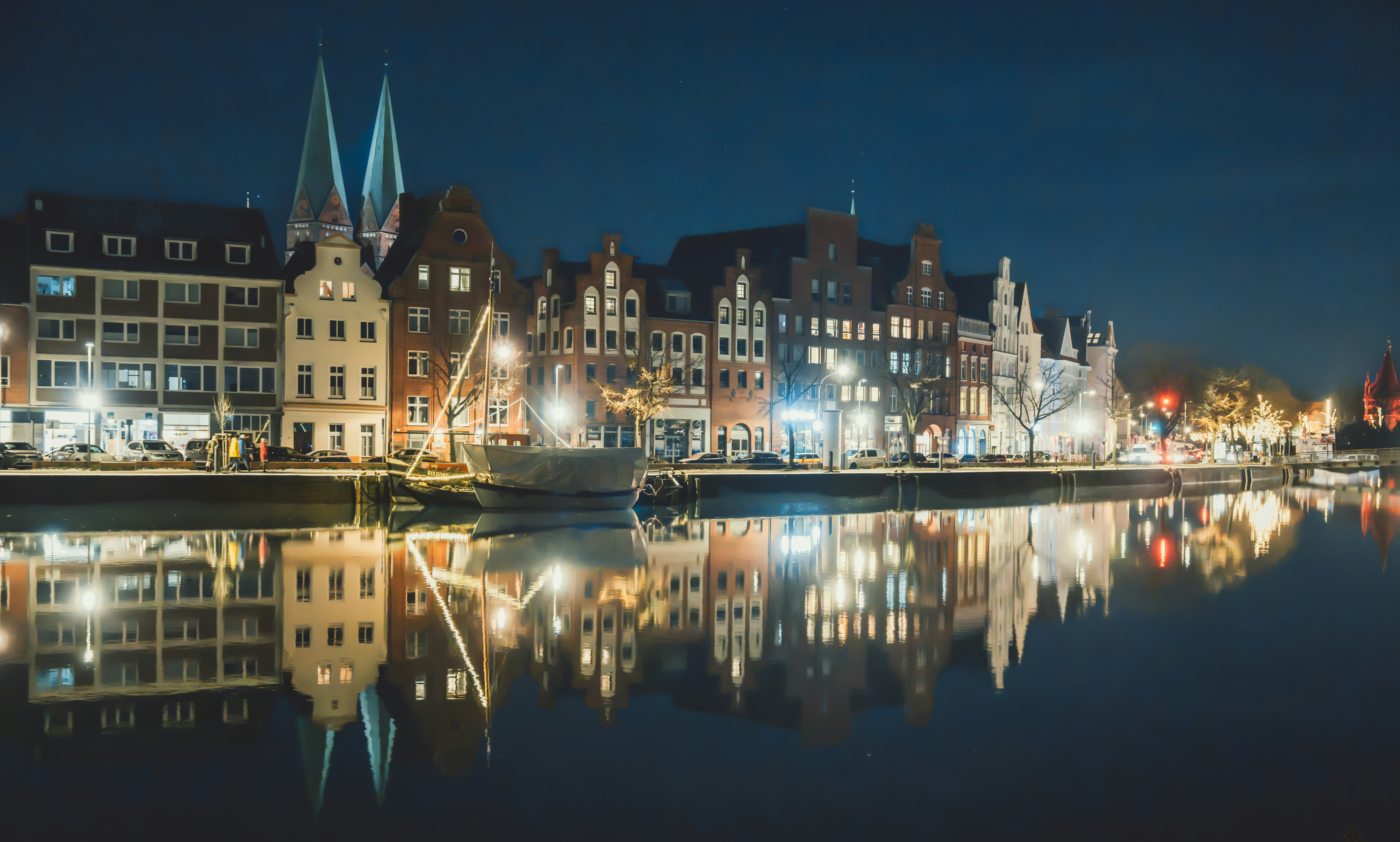 Night Harbor in Delft: Reflections and Red Brick Serenity
